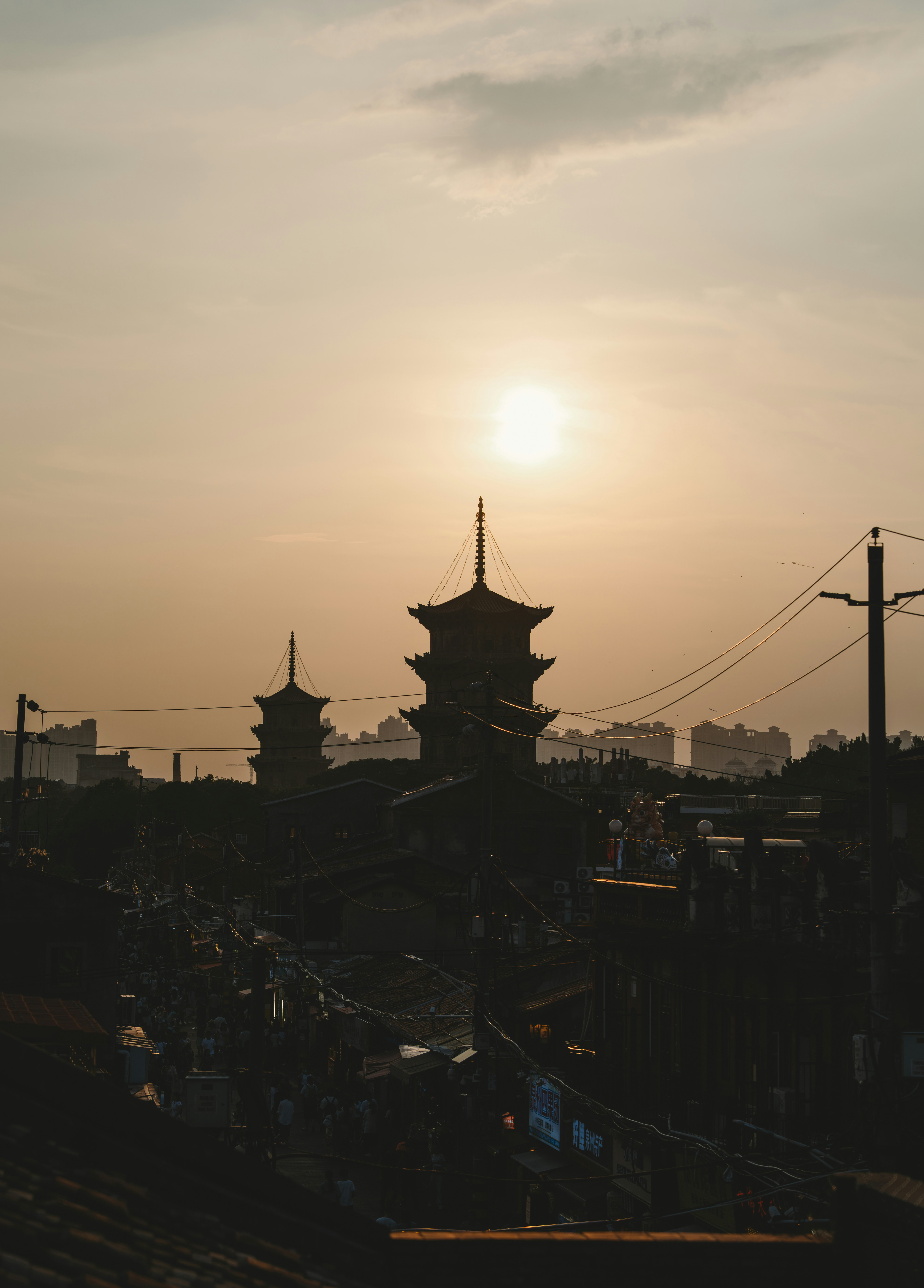 Sunlit Silhouette Over a Historic Cityscape