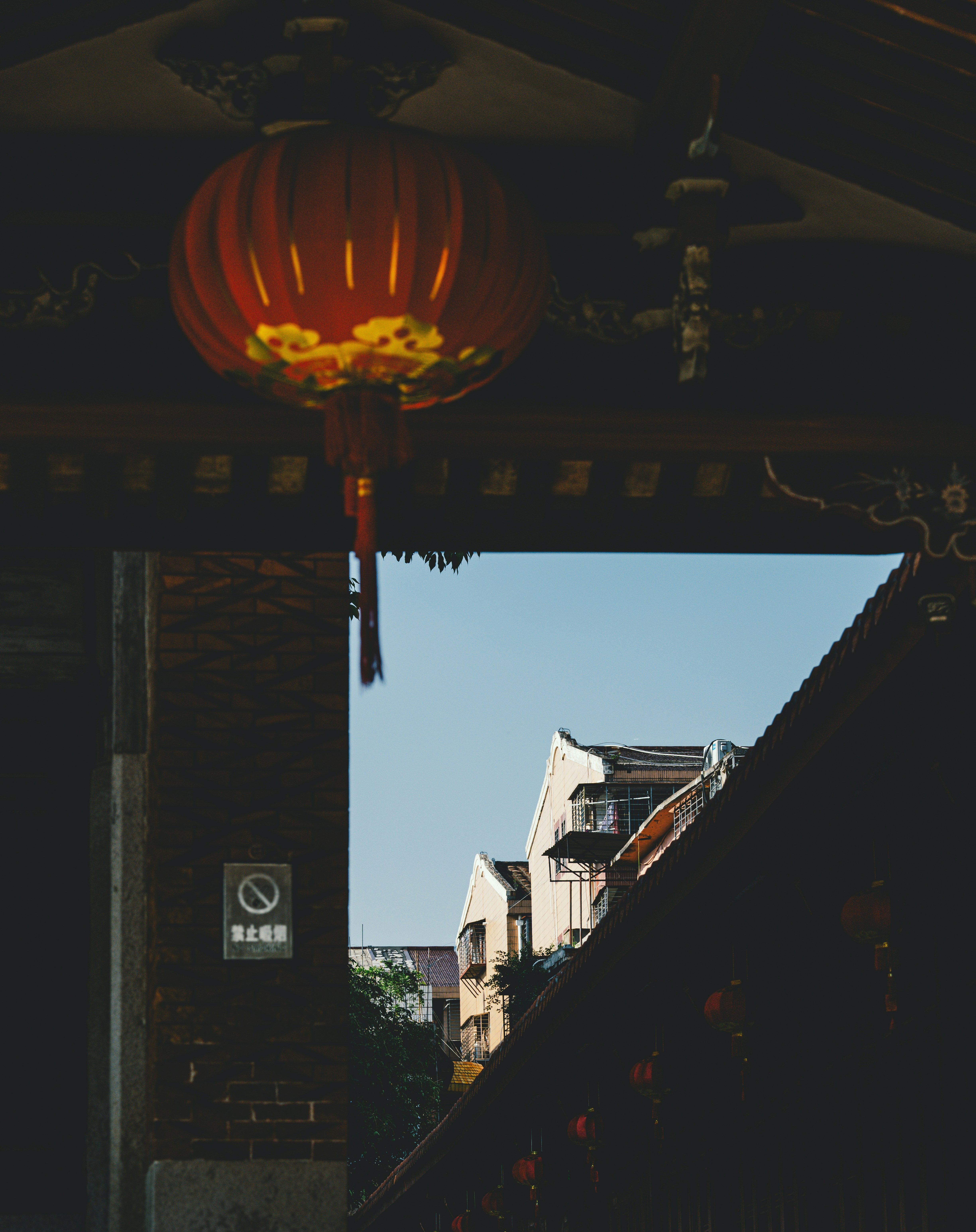 Crimson Lantern Above the Quiet Alley