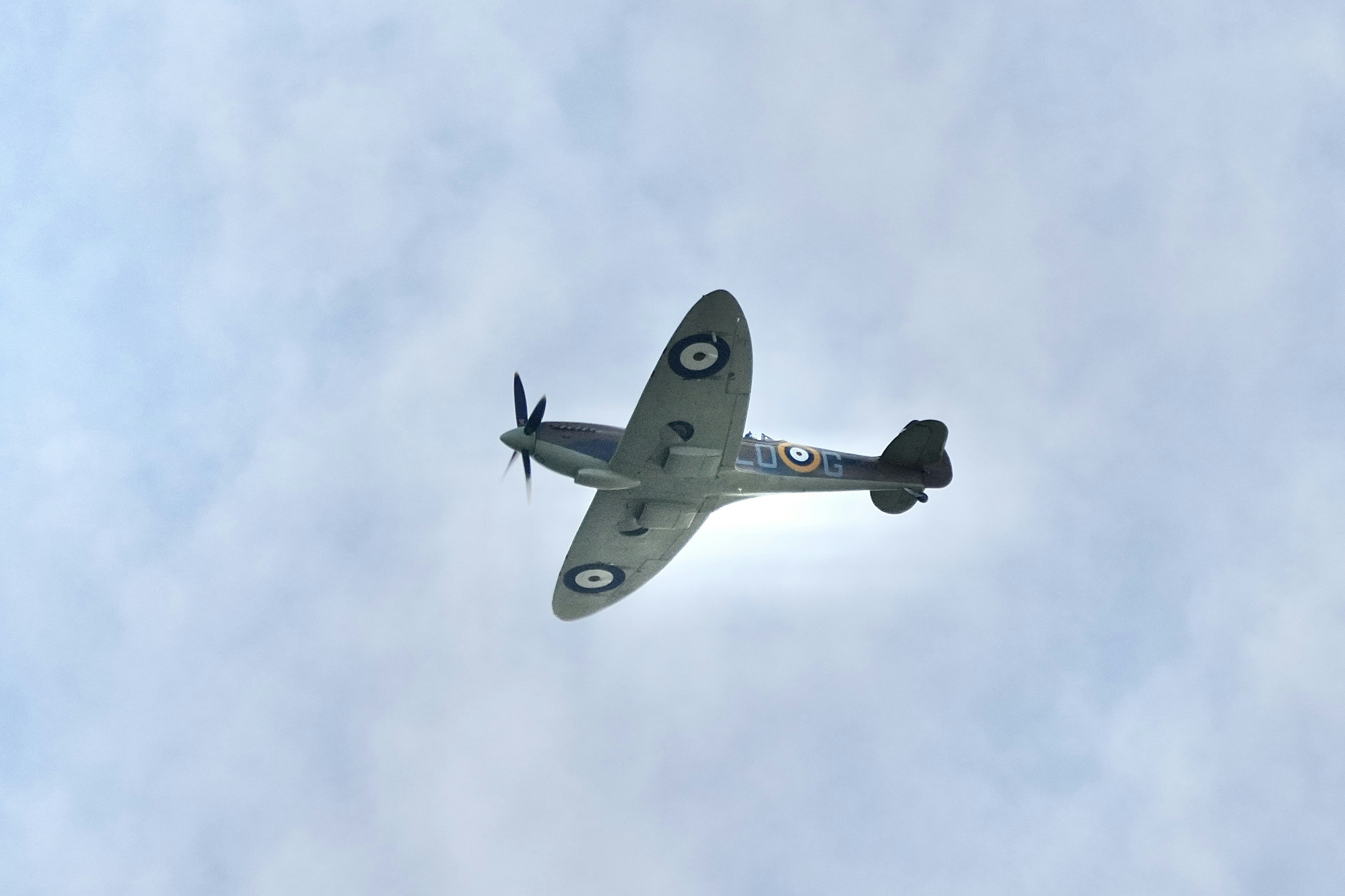 Vintage Spitfire Tracing a Quiet Sky