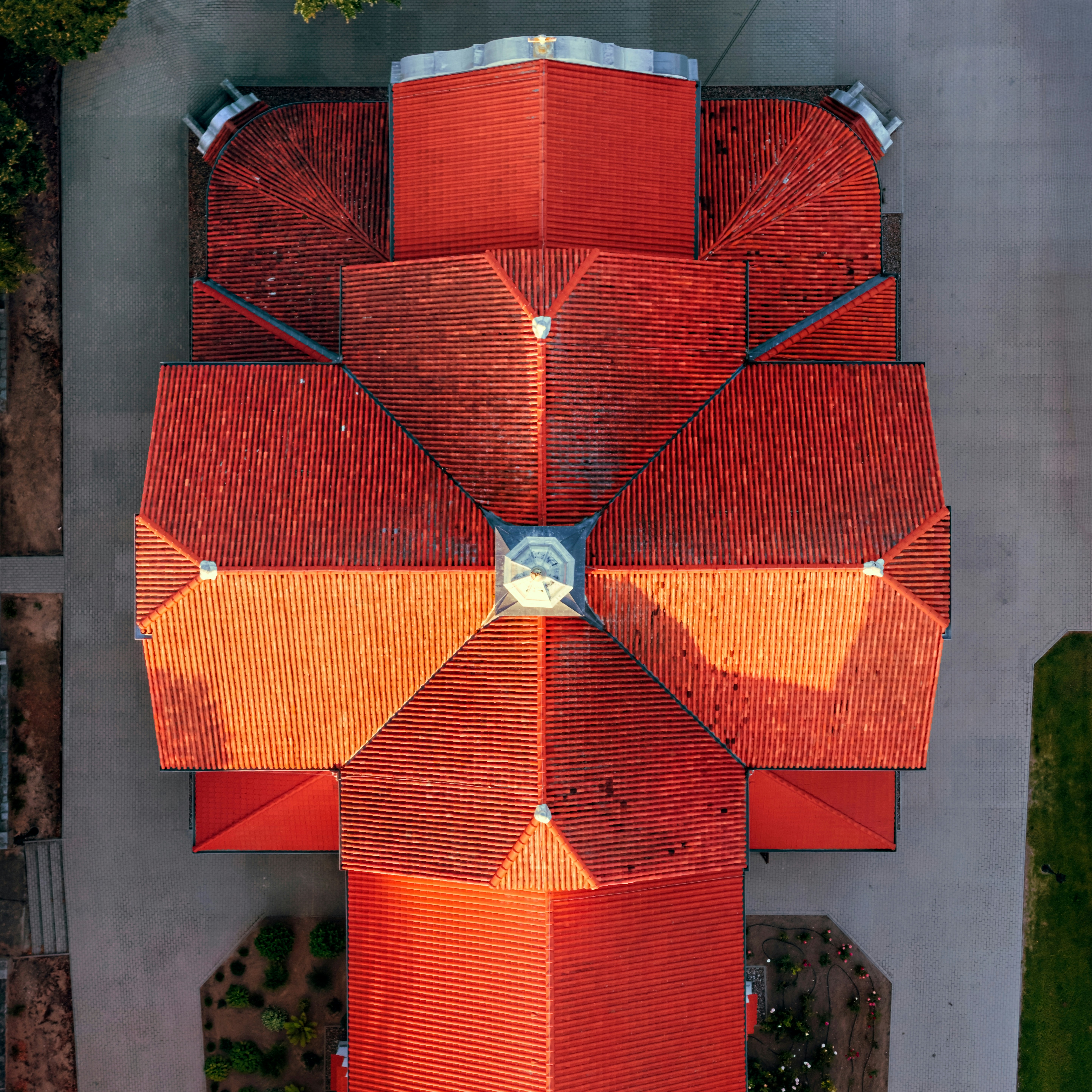 Red-Tiled Cathedral: Aerial Symmetry of a Rooftop Mosaic