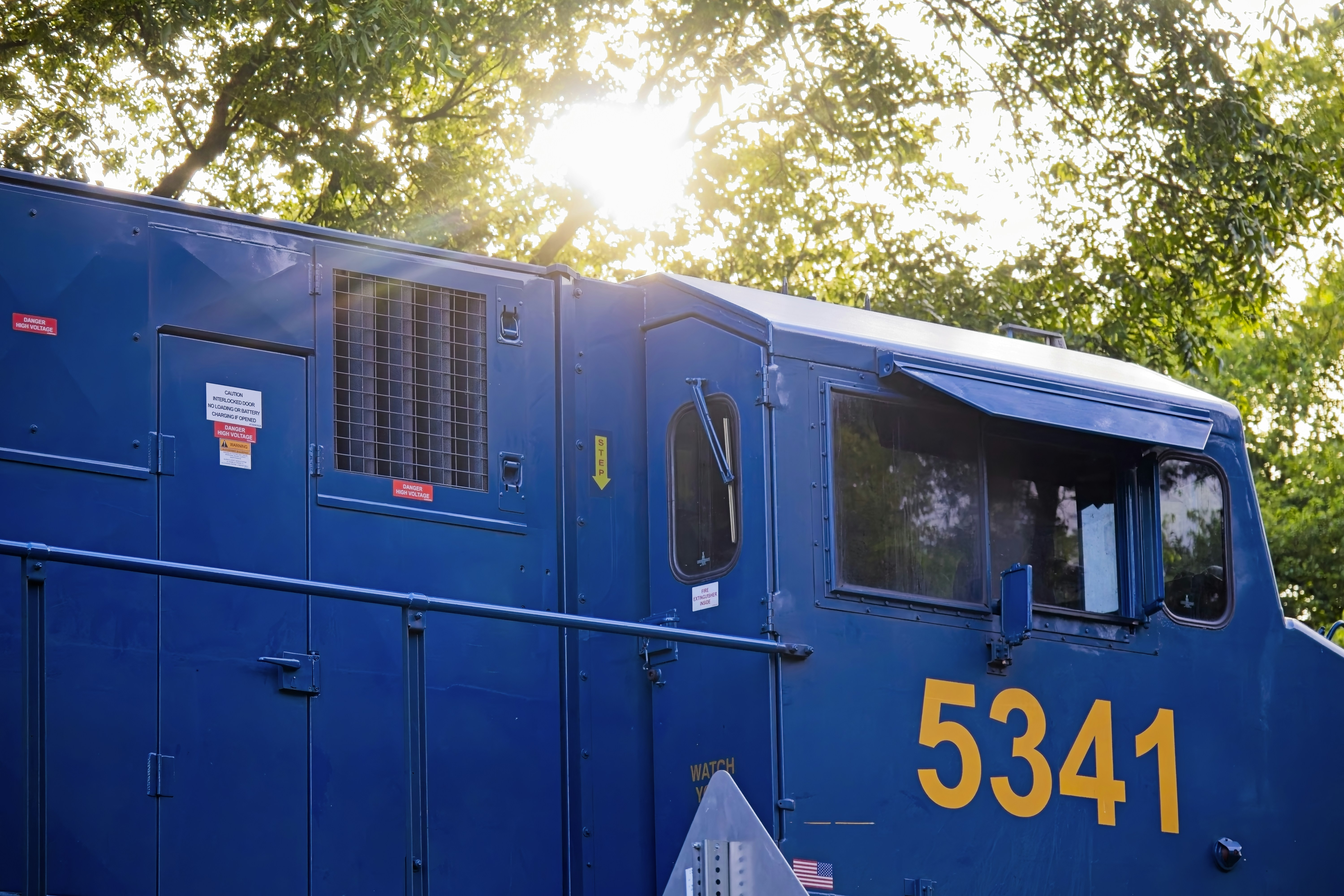 Blue Locomotive in Morning Sun