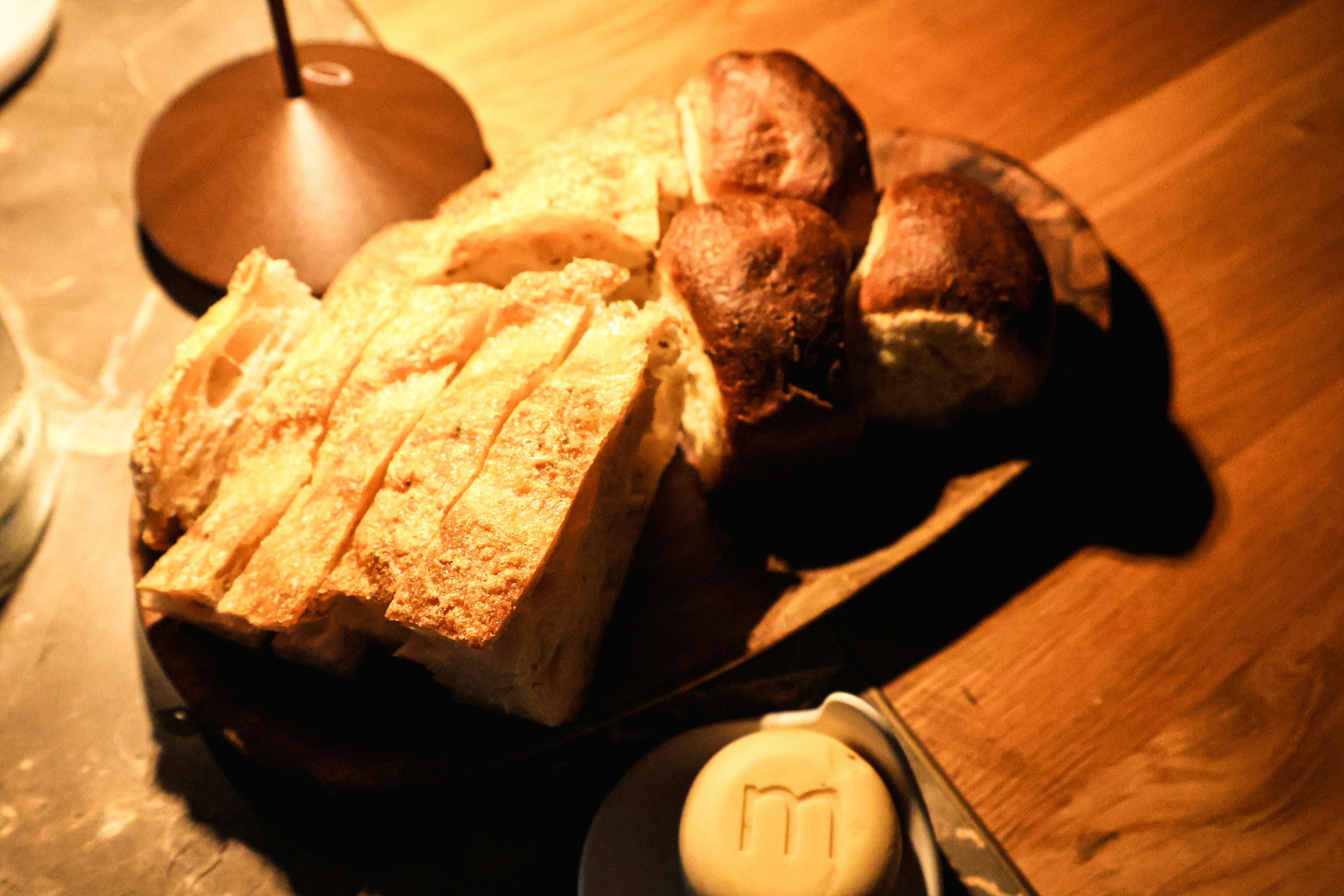 Warm Hearth: Slices of Crust and Crumbs by Evening Light