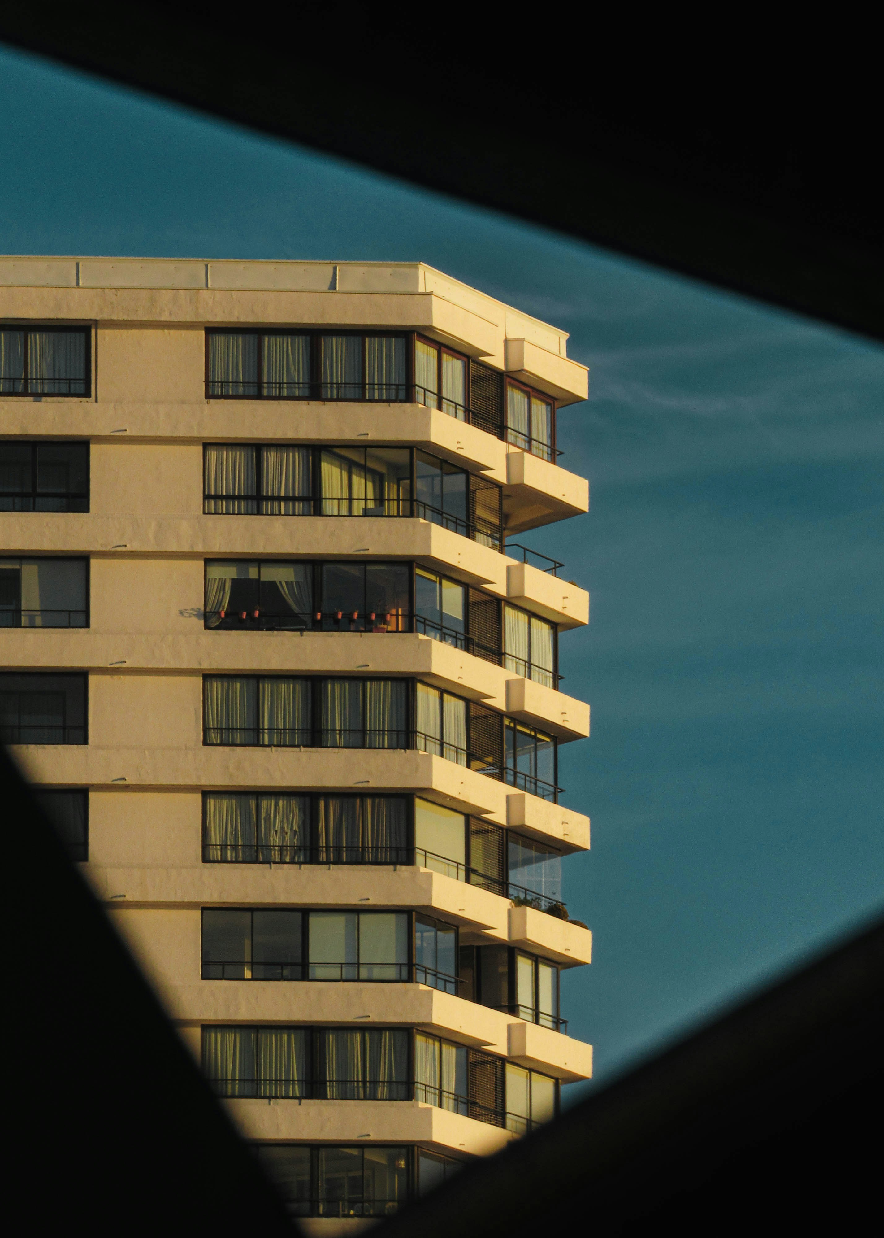 Concrete Facade Framed by a Circular Shadow