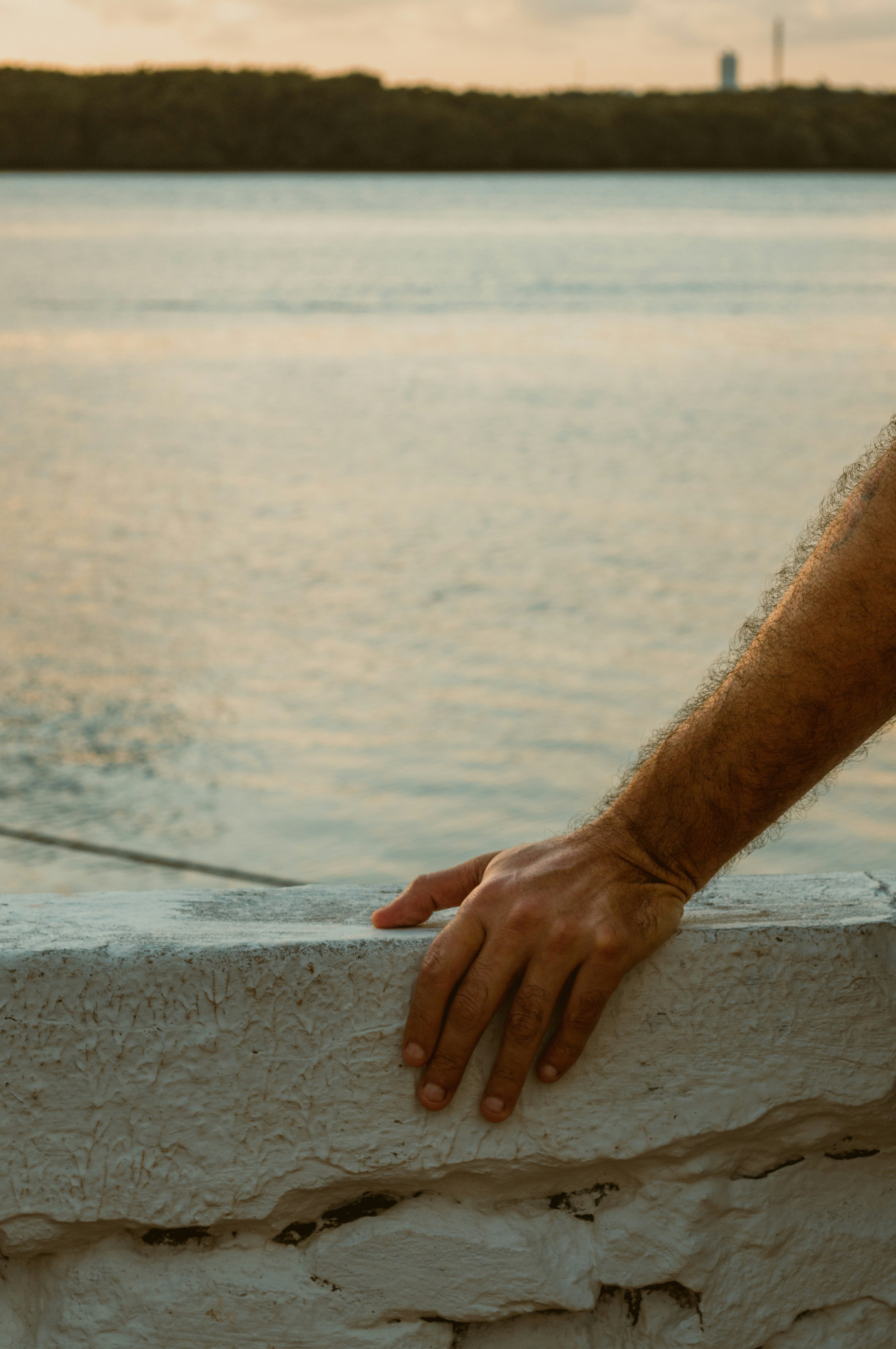 Holding the Horizon: A Close Moment by the Water