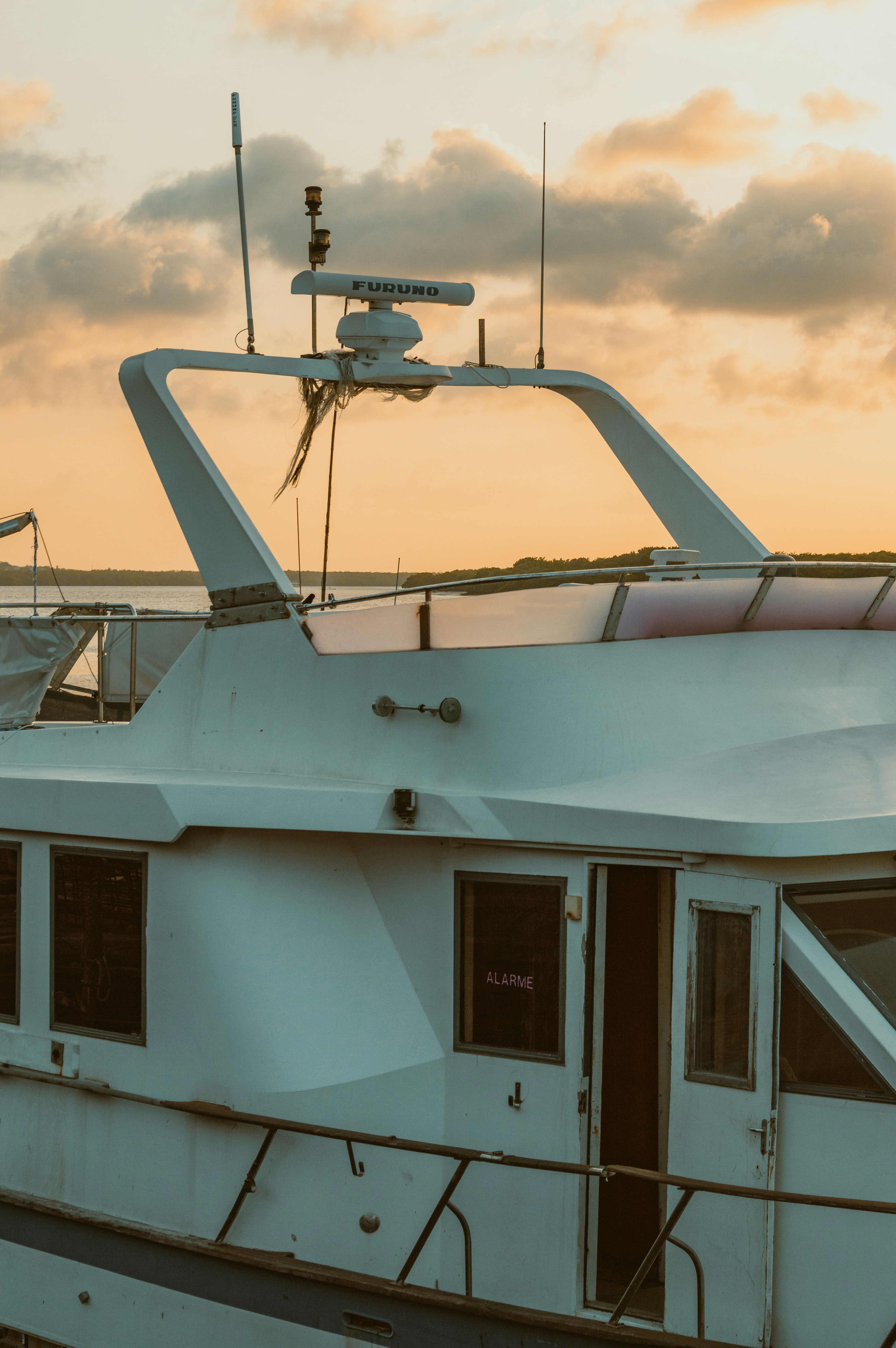 Sunset on a Docked Vessel: The Arch of a Dreaming Hull