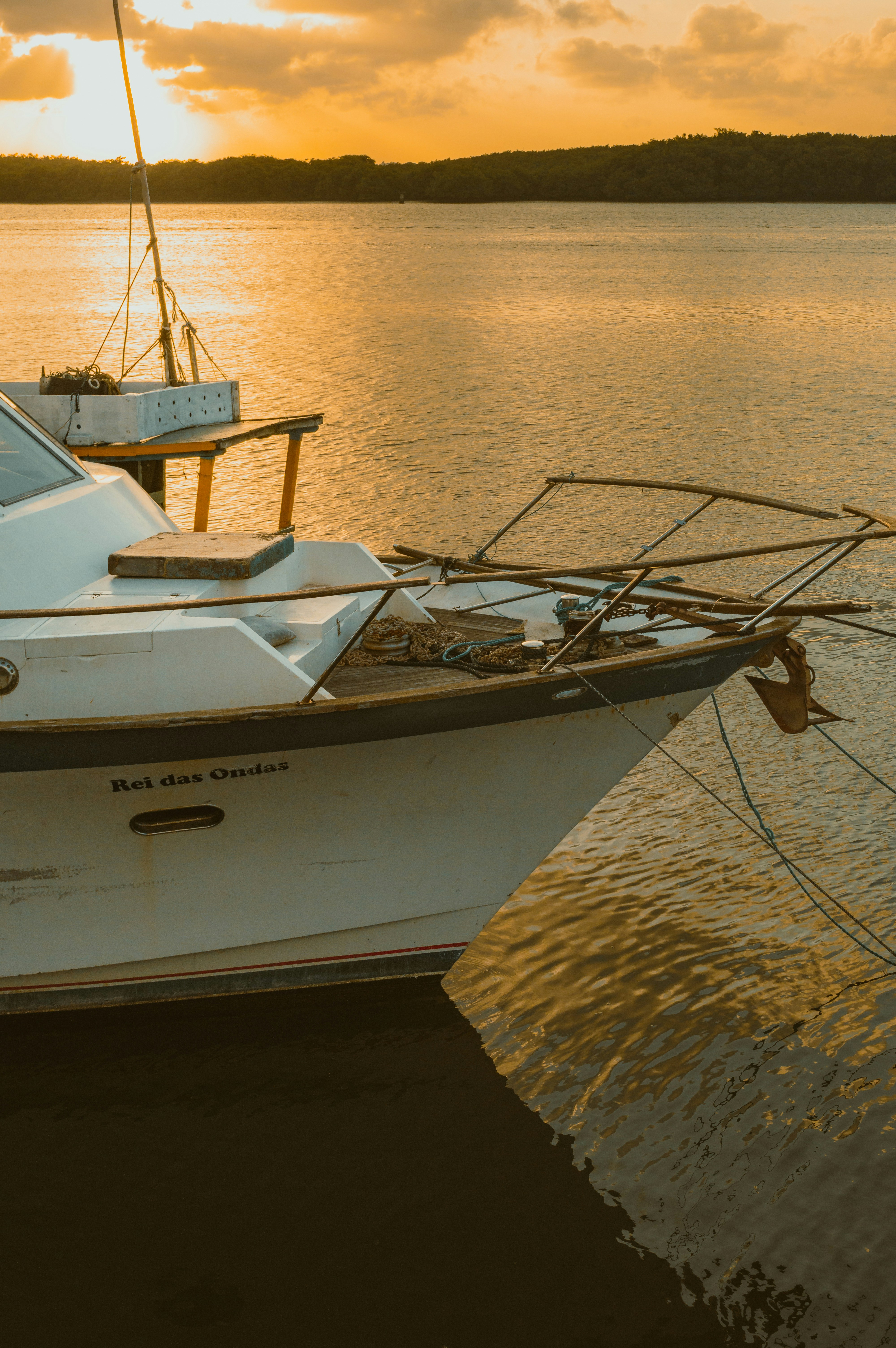 Sunlit Hull at Dusk: A Vessel Graces the Quiet Shore