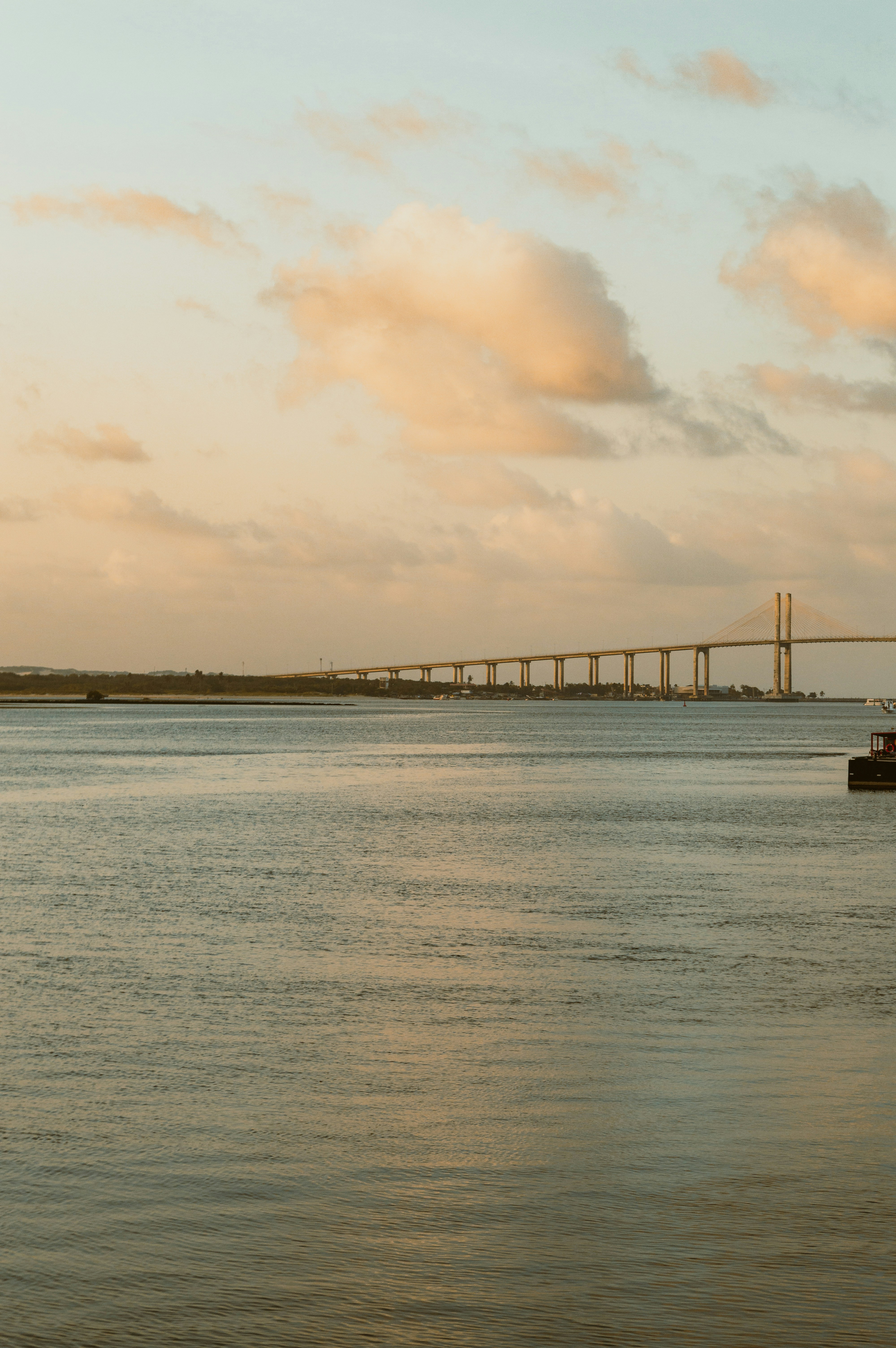 Long Spans and Quiet Water: Sunset Over the Bridge