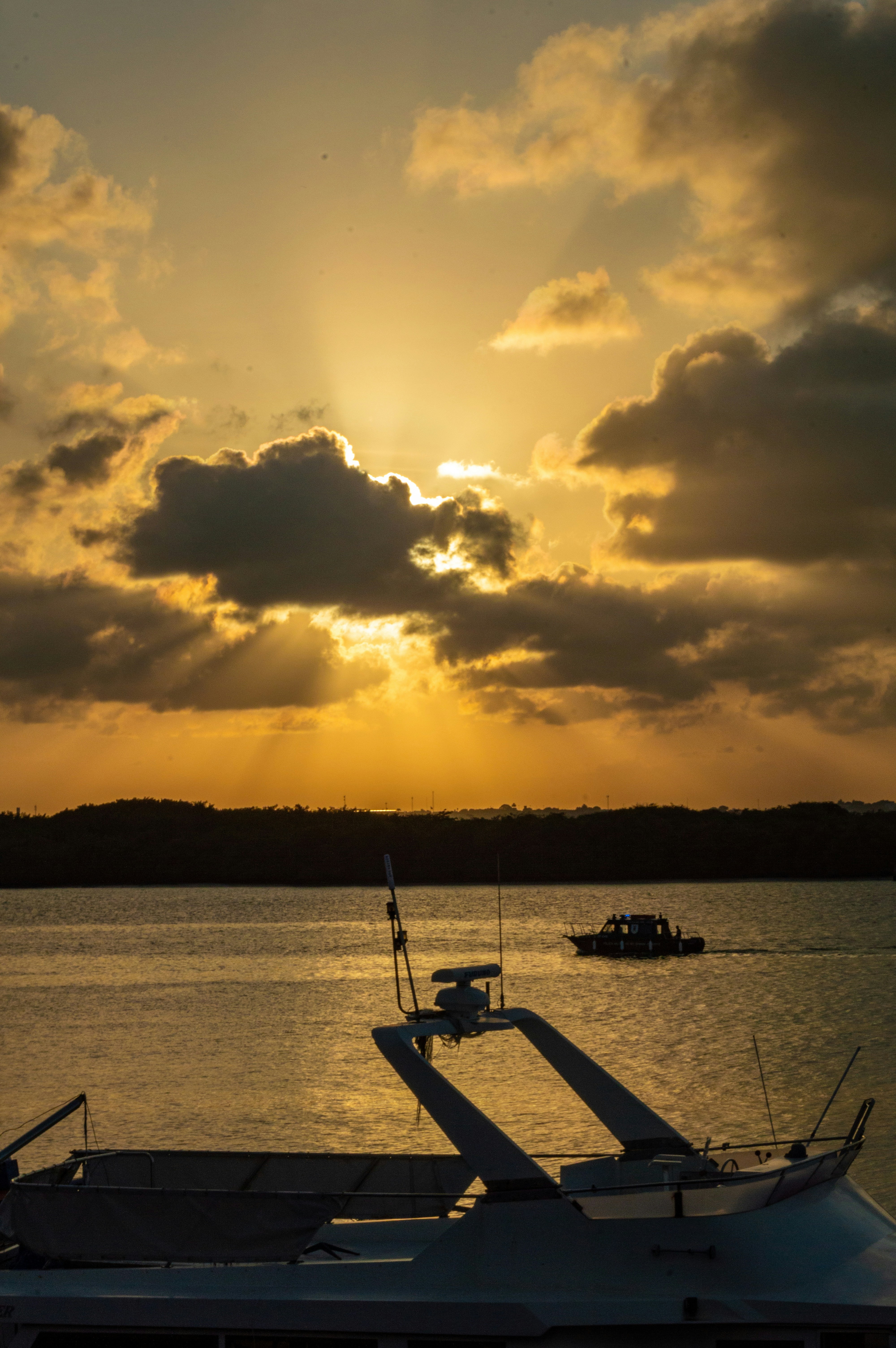 Sunbeams Over a Quiet Marina at Dusk