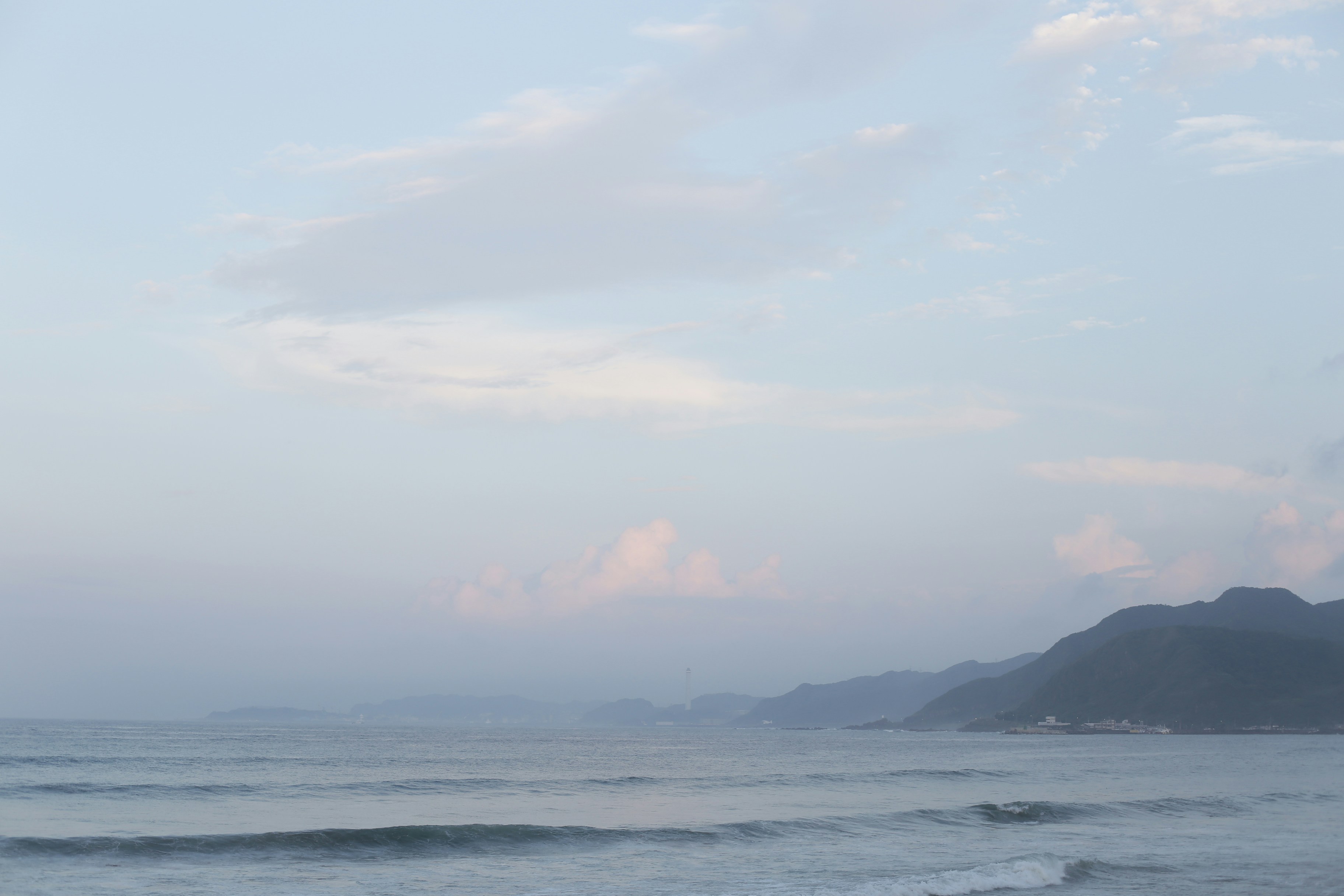 Low Tide at the Quiet Coast: Hills on the Horizon