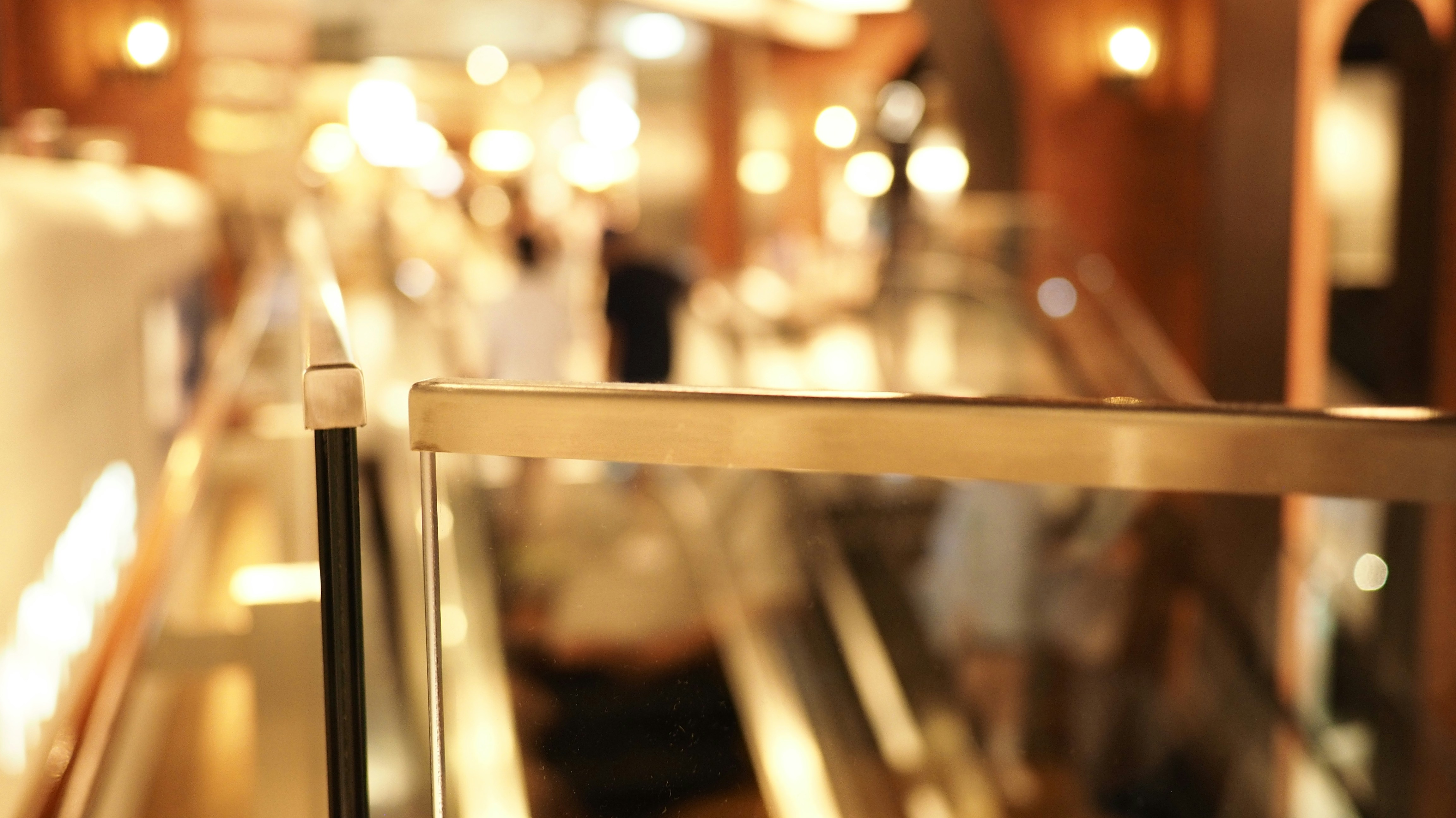 Edge of Glass: An Out-of-Focus Corridor in a Shopping Mall