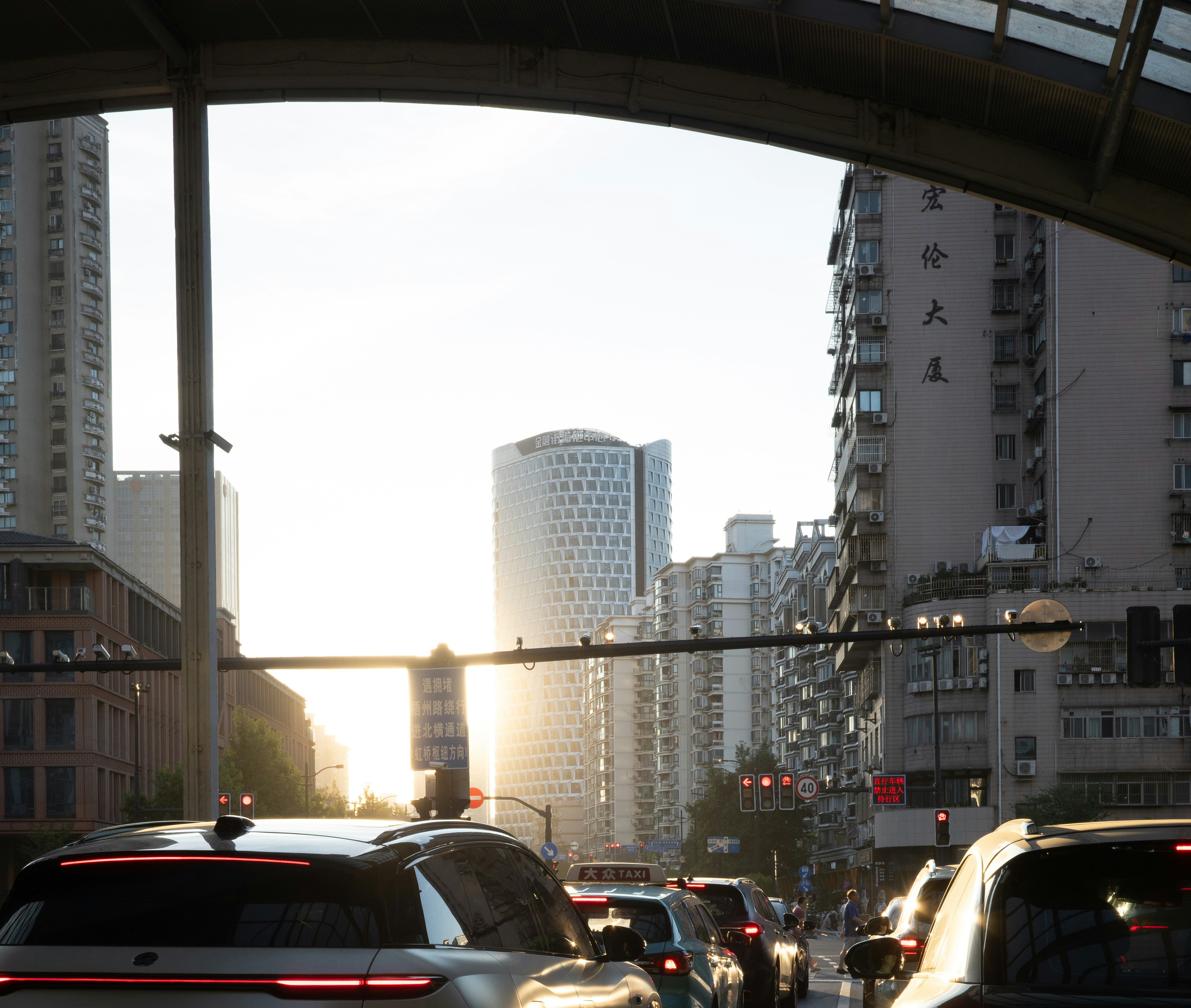 Urban Horizon: Light Strikes Through a City Grid