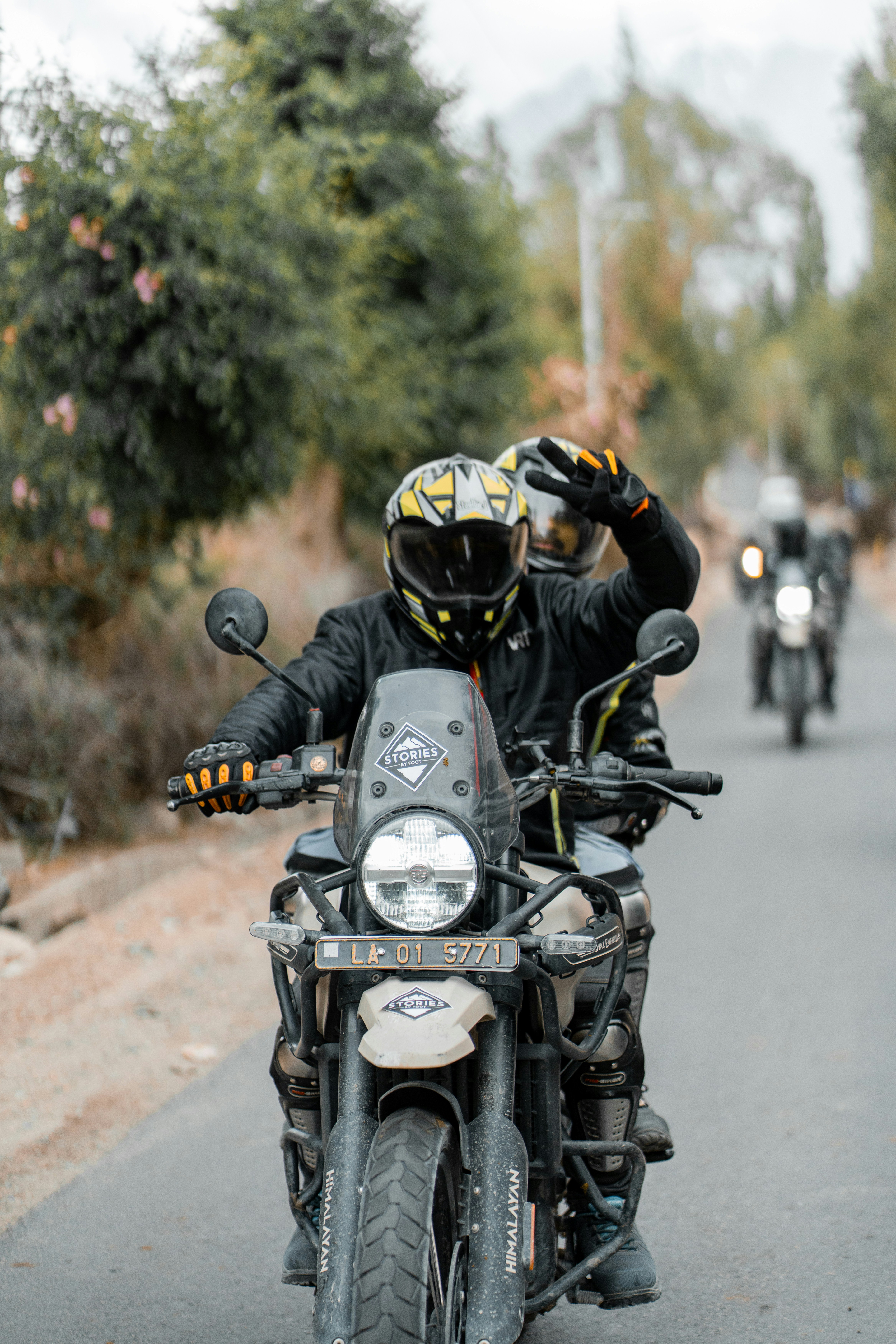 Front Rider: The Wave of Asphalt and Helmeted Grit