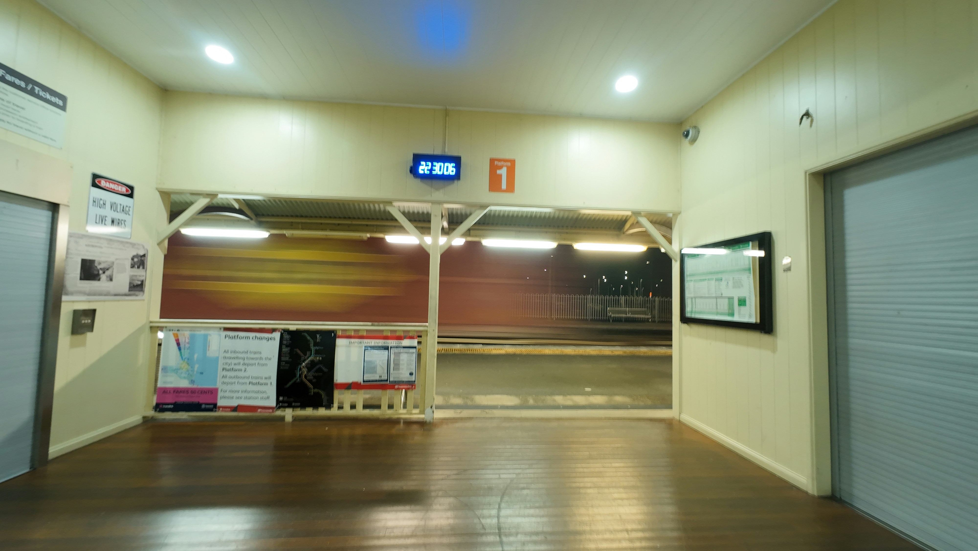 Quiet Platform at a Dim Station Hall