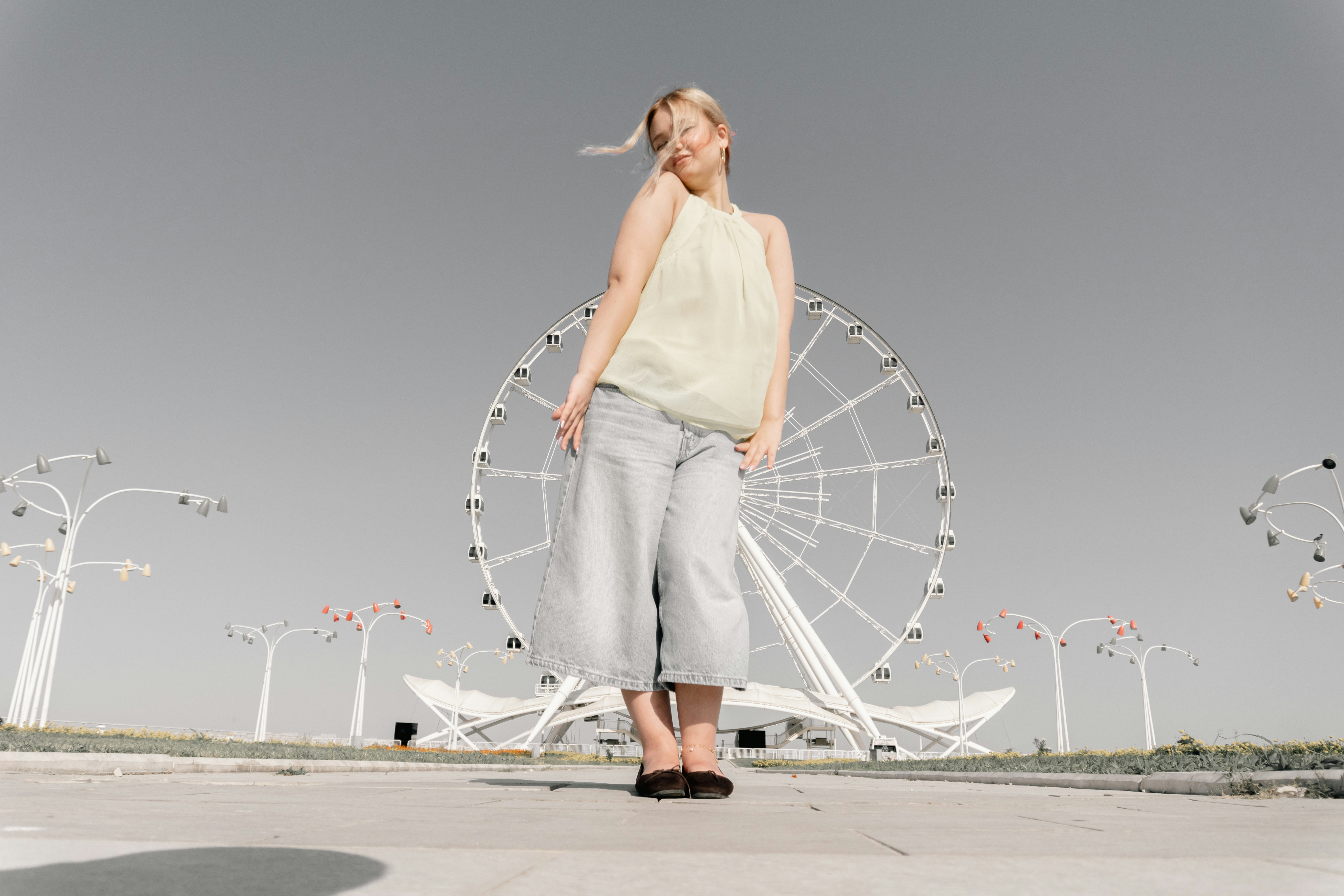 Central Figure at the Edge of the Ferris Wheel Skyline
