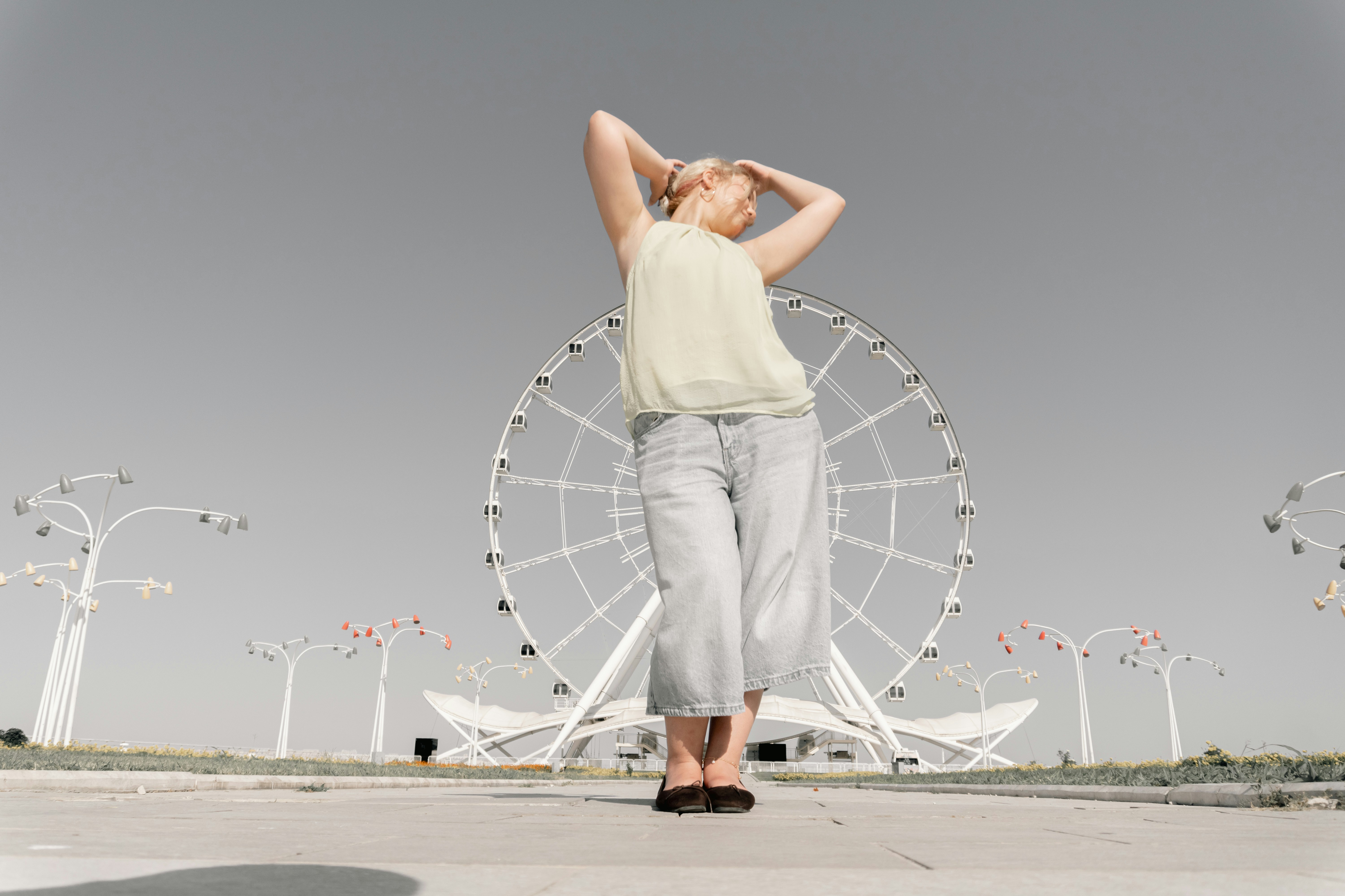 Posture Under the Giant Ferris Wheel