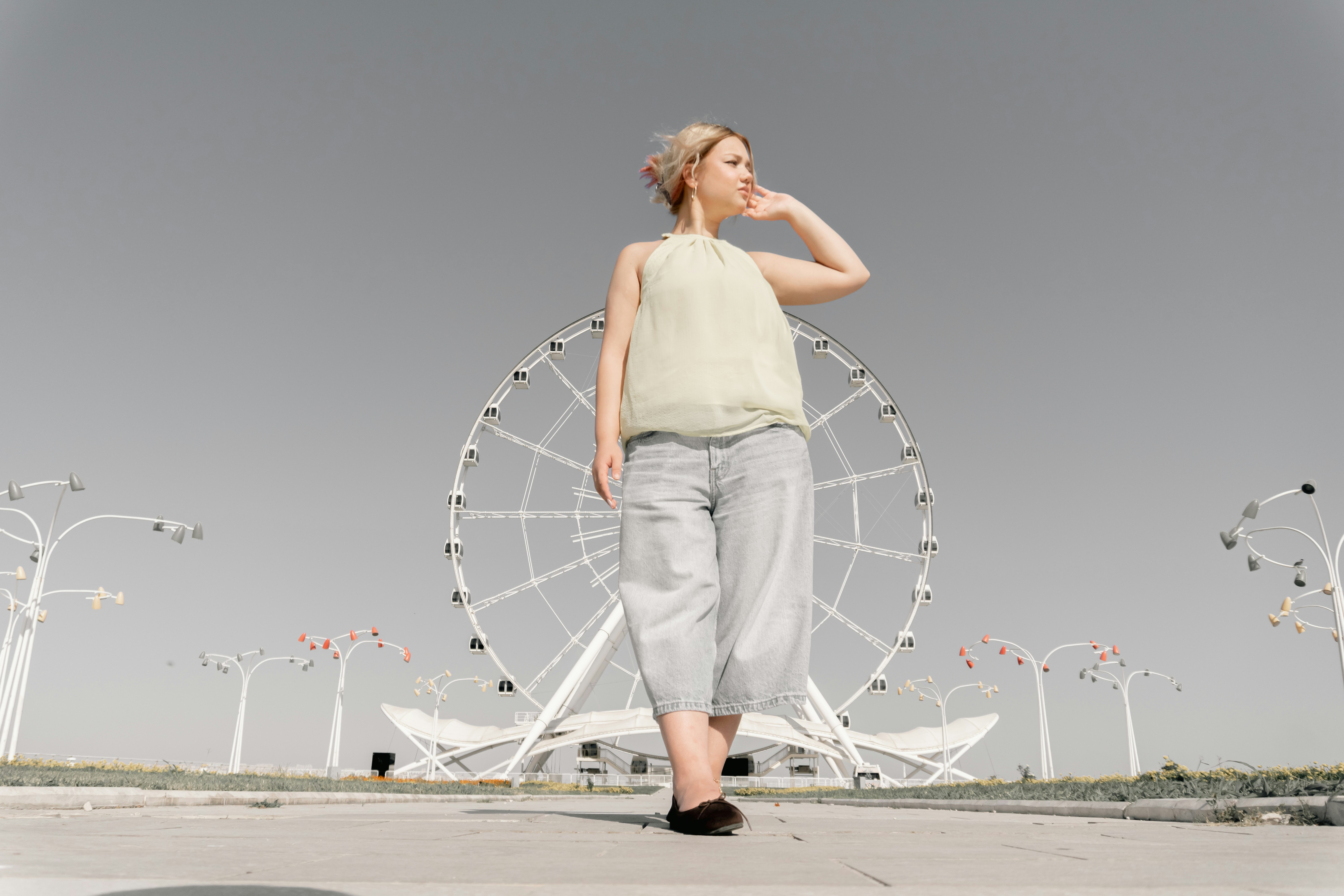 Elevated Pose with Ferris Wheel Backdrop