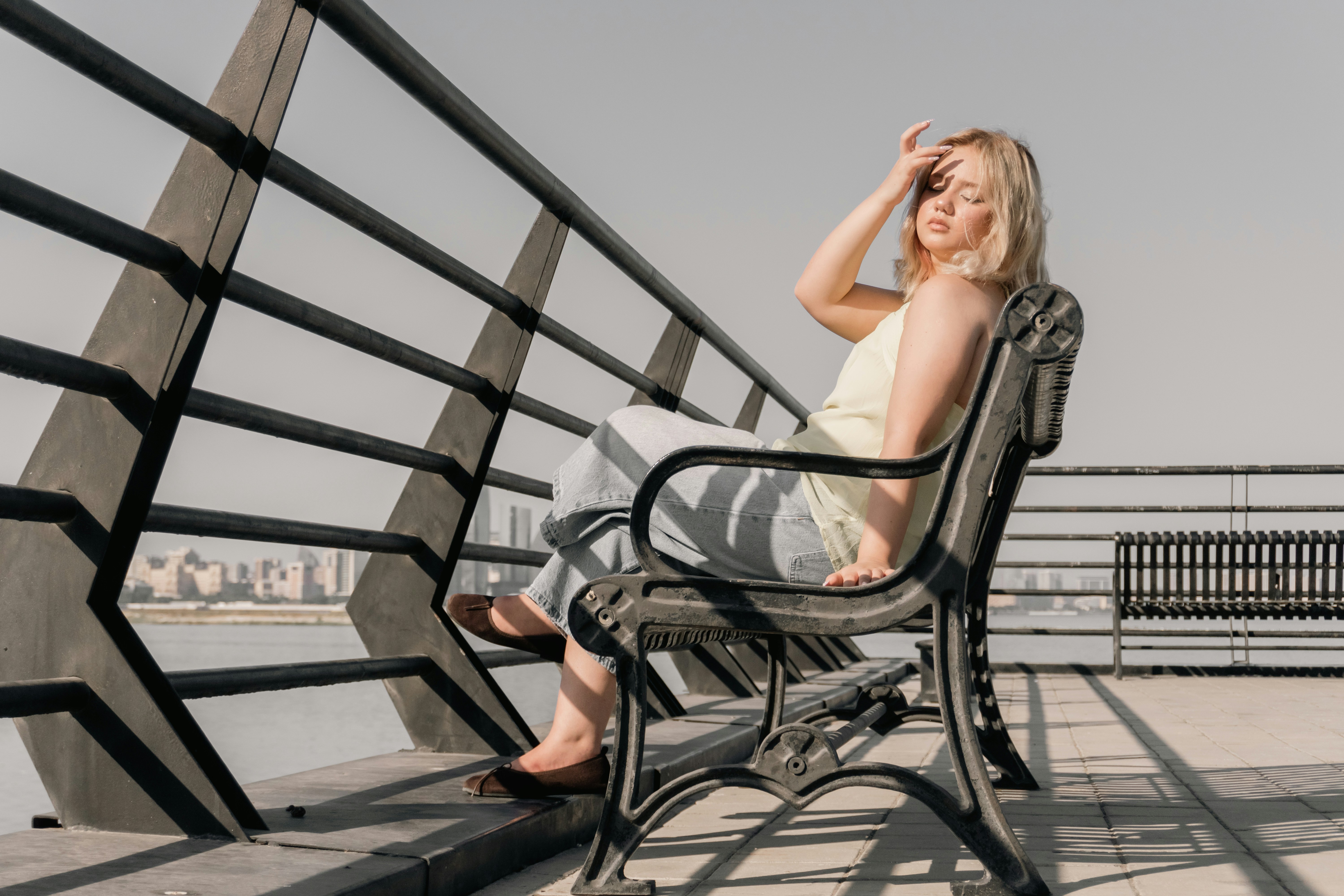 Sunlit Balcony Recline: A Portrait in Quiet Confidence