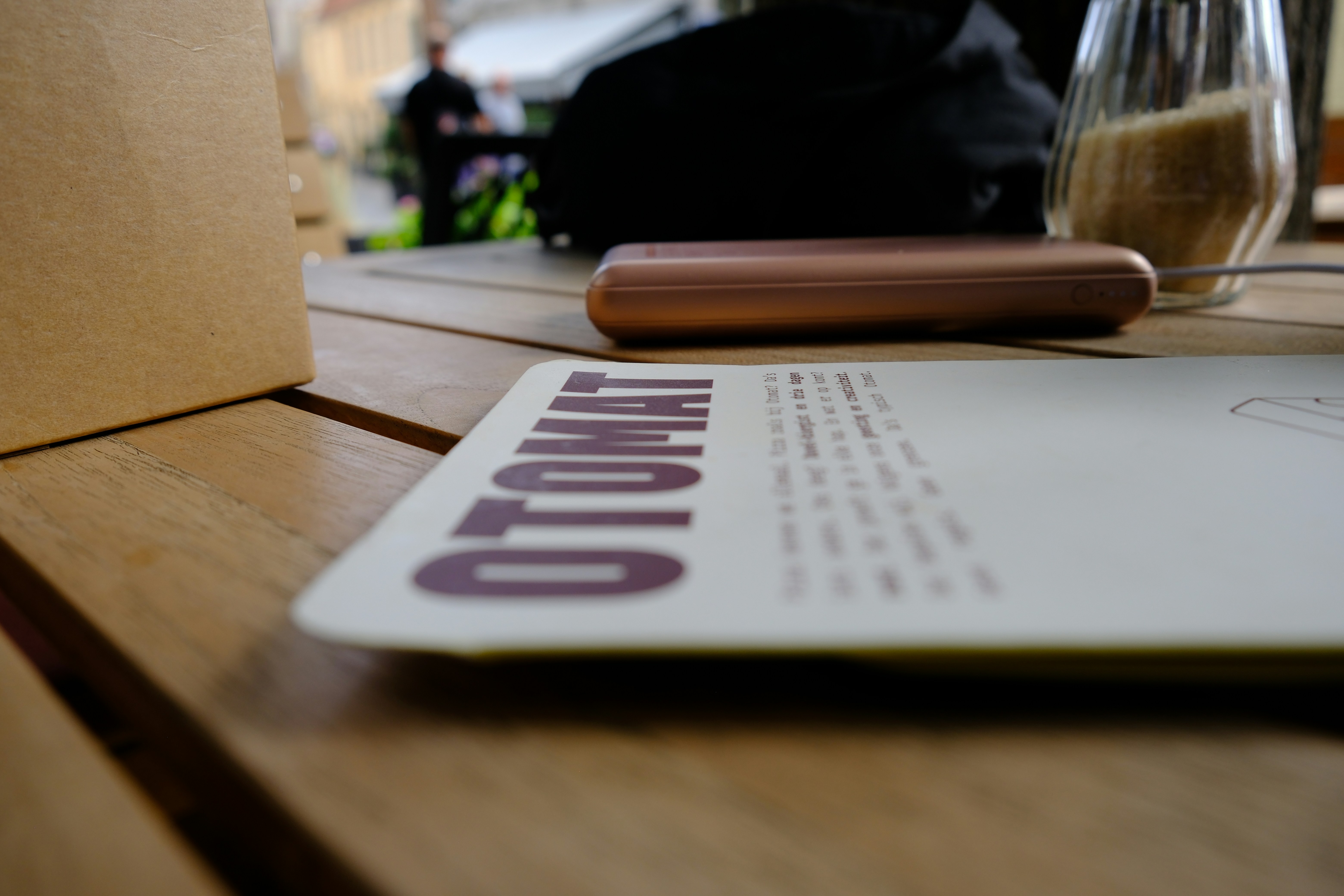 Cafe Card On a Wooden Table: A Quiet Desert of Everyday Details