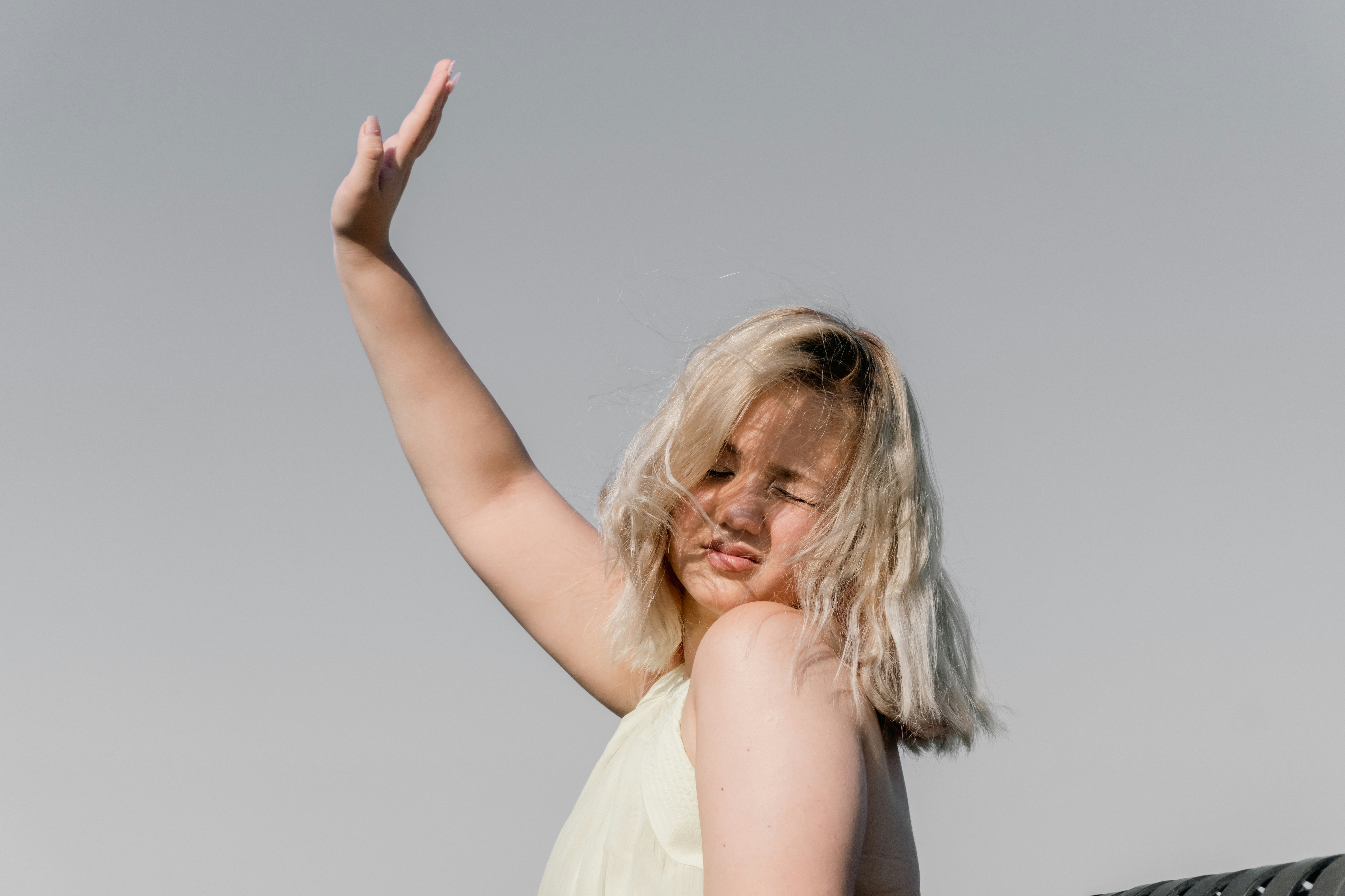 Blonde Confidence Under an Open Sky