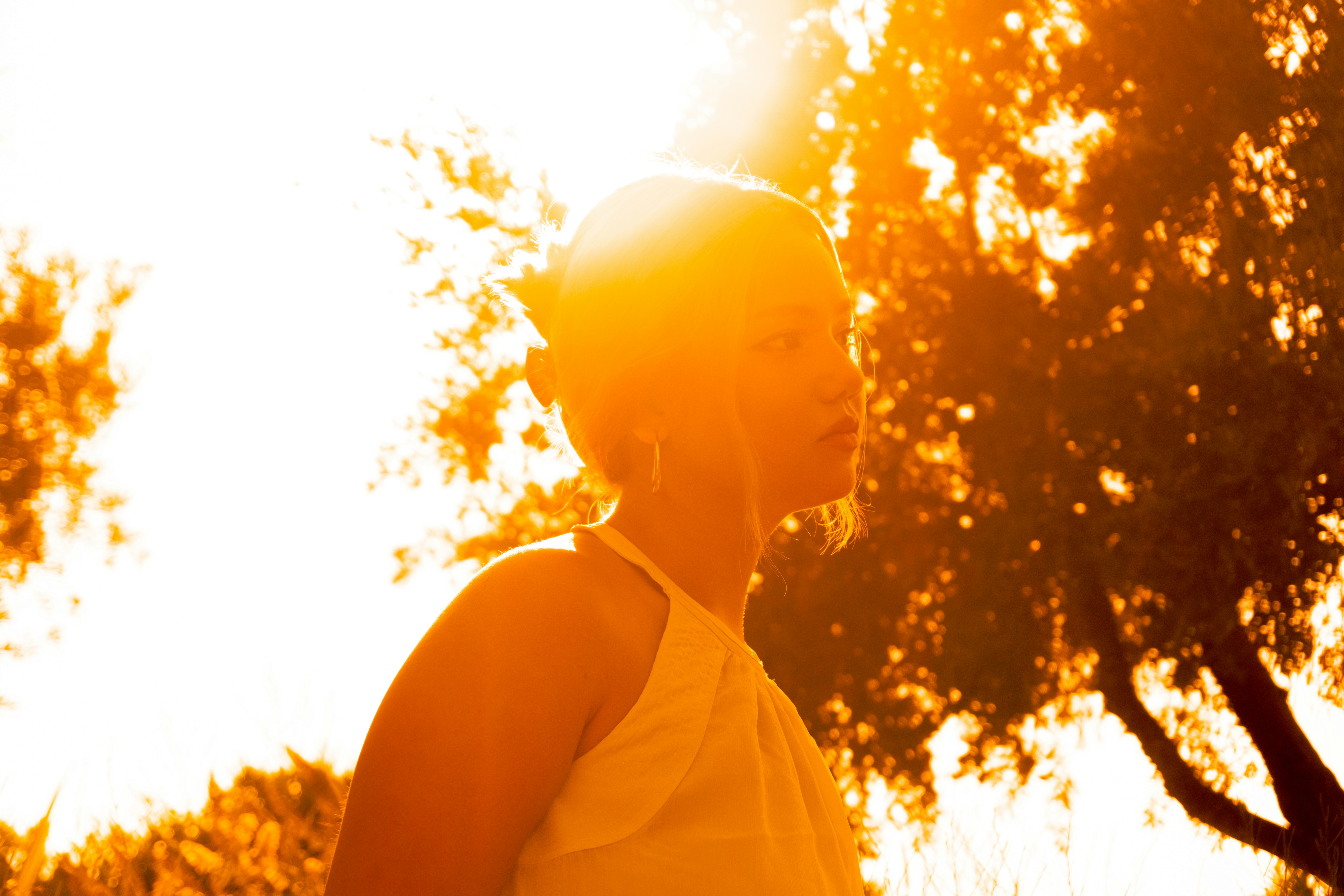 Sunlit Quiet: A Portrait Eclipsed by Warm Light