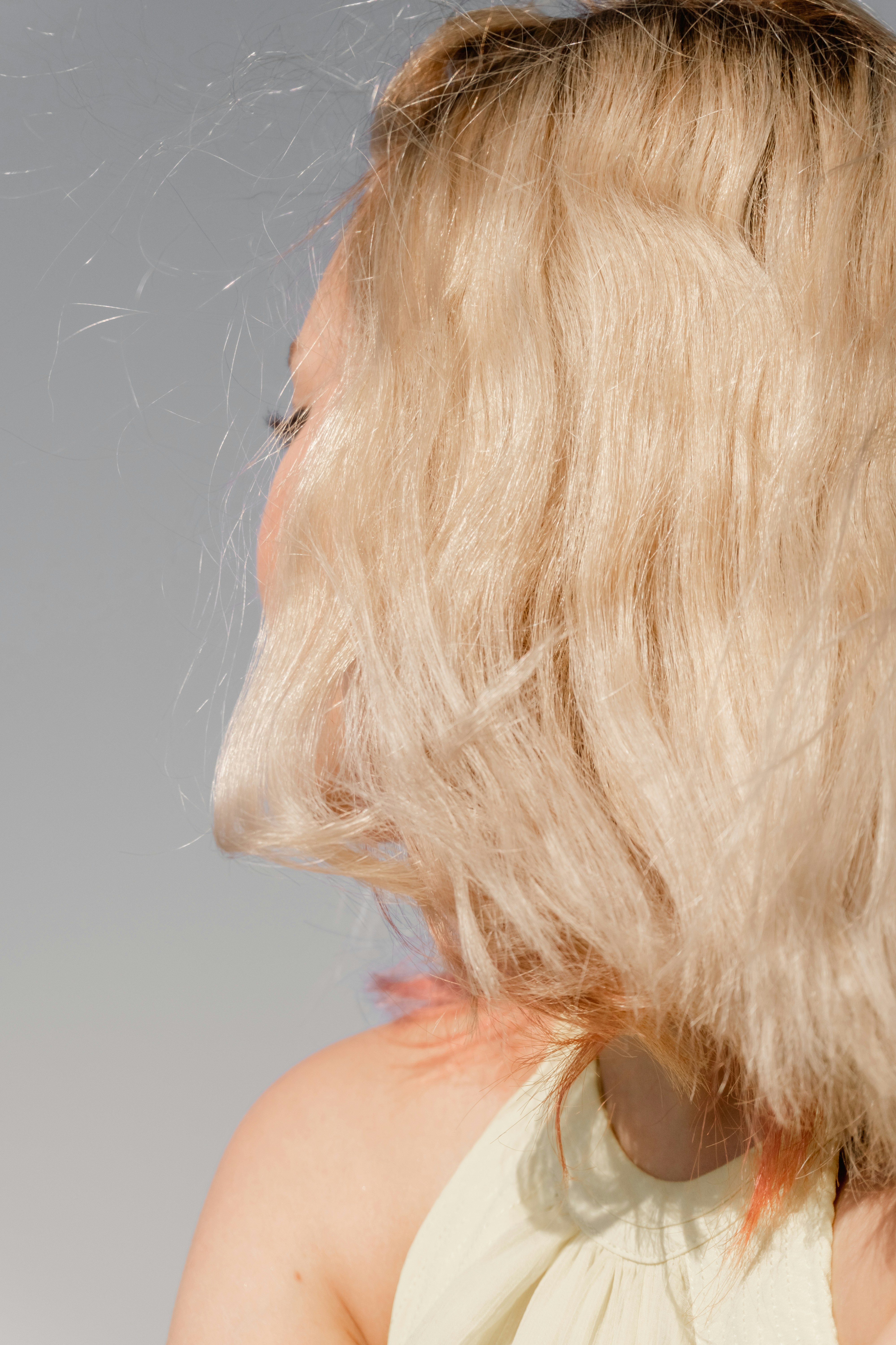 Blonde Hair in Soft Backlight: Portrait Crop at Sunset