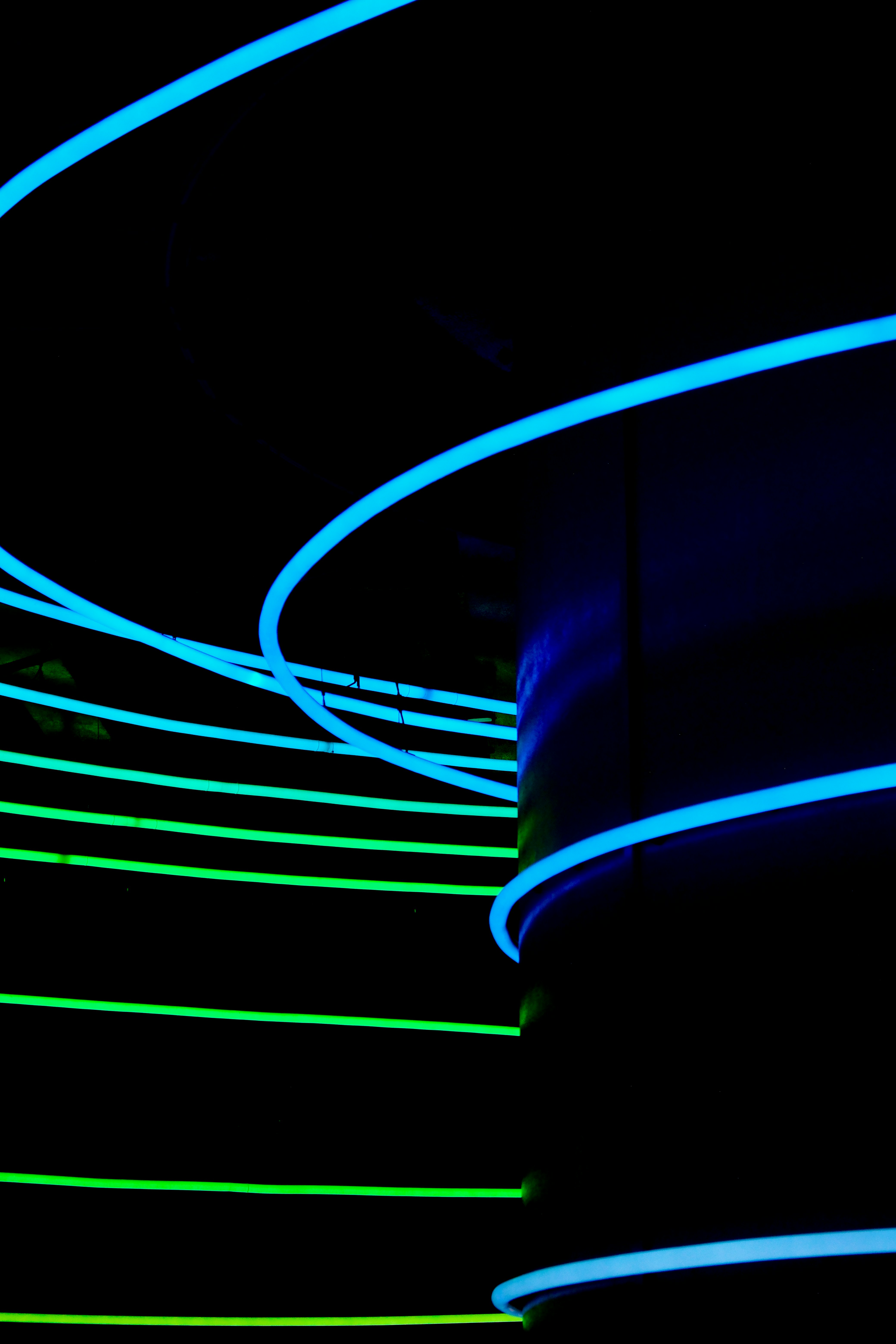 Neon Rings: A Midnight Spiral Through Colorful Light Trails