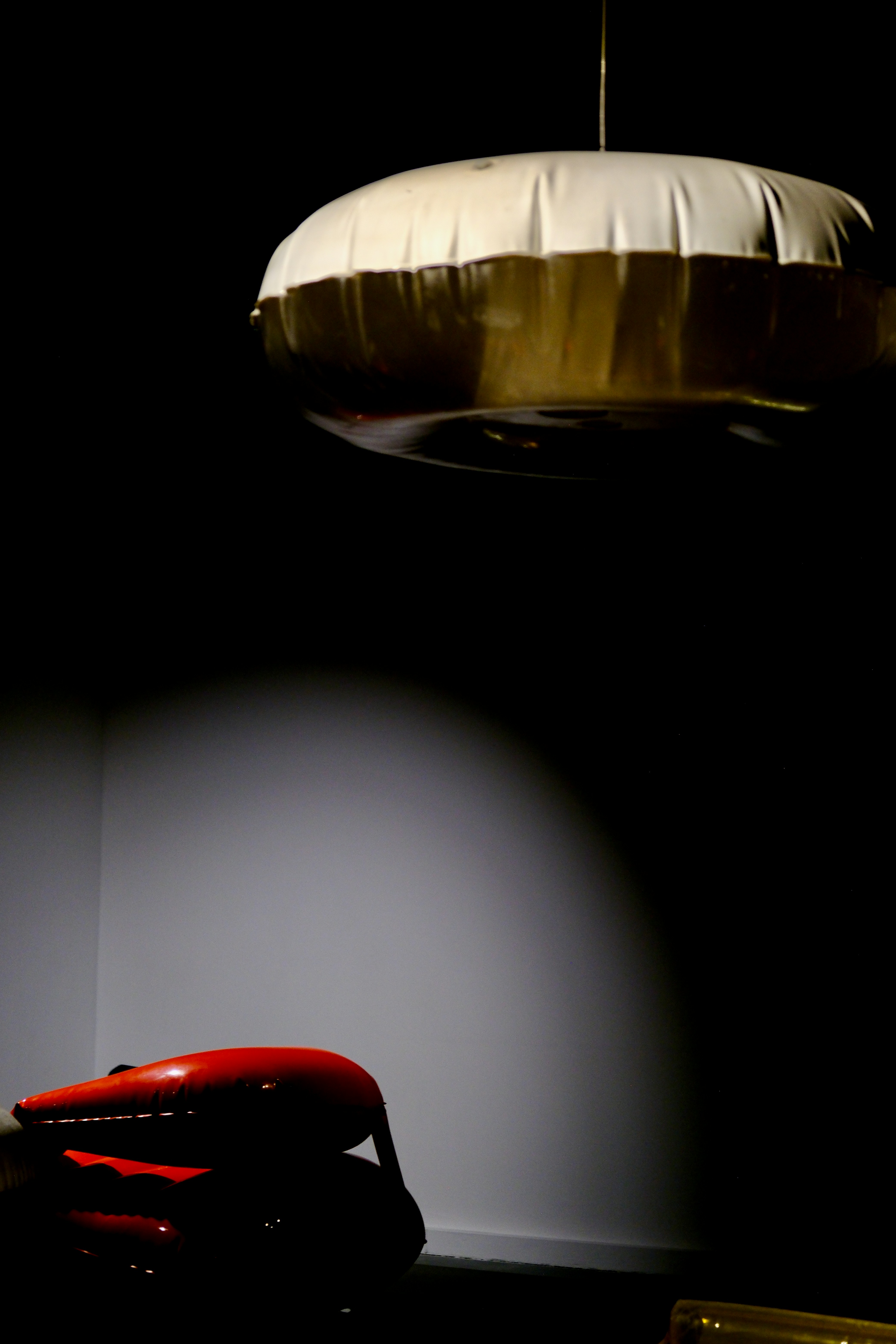 Floating Ring, Grounded by Spotlight: A Night Still Life
