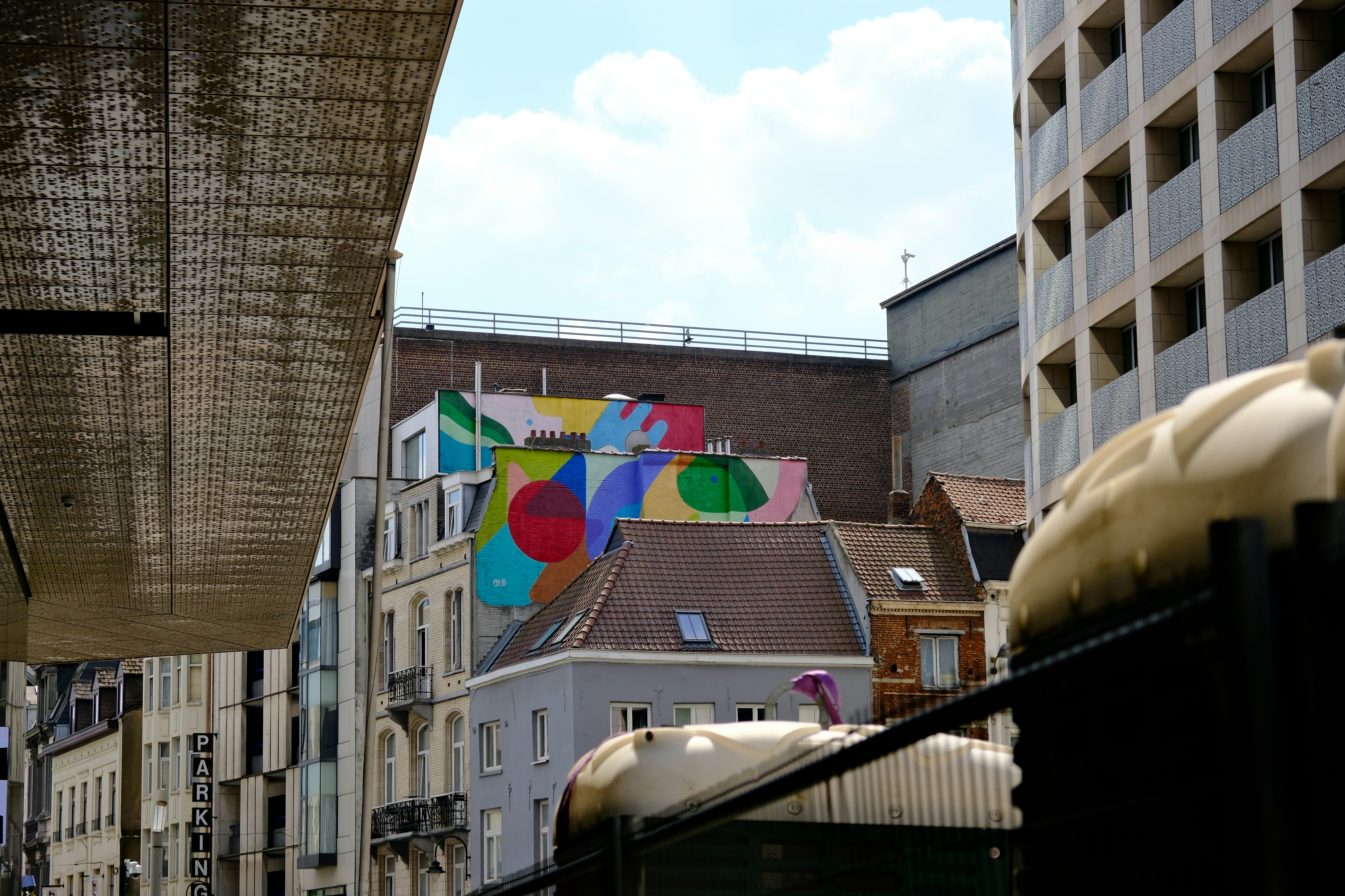 Urban Mural Rising Above the City Rooflines