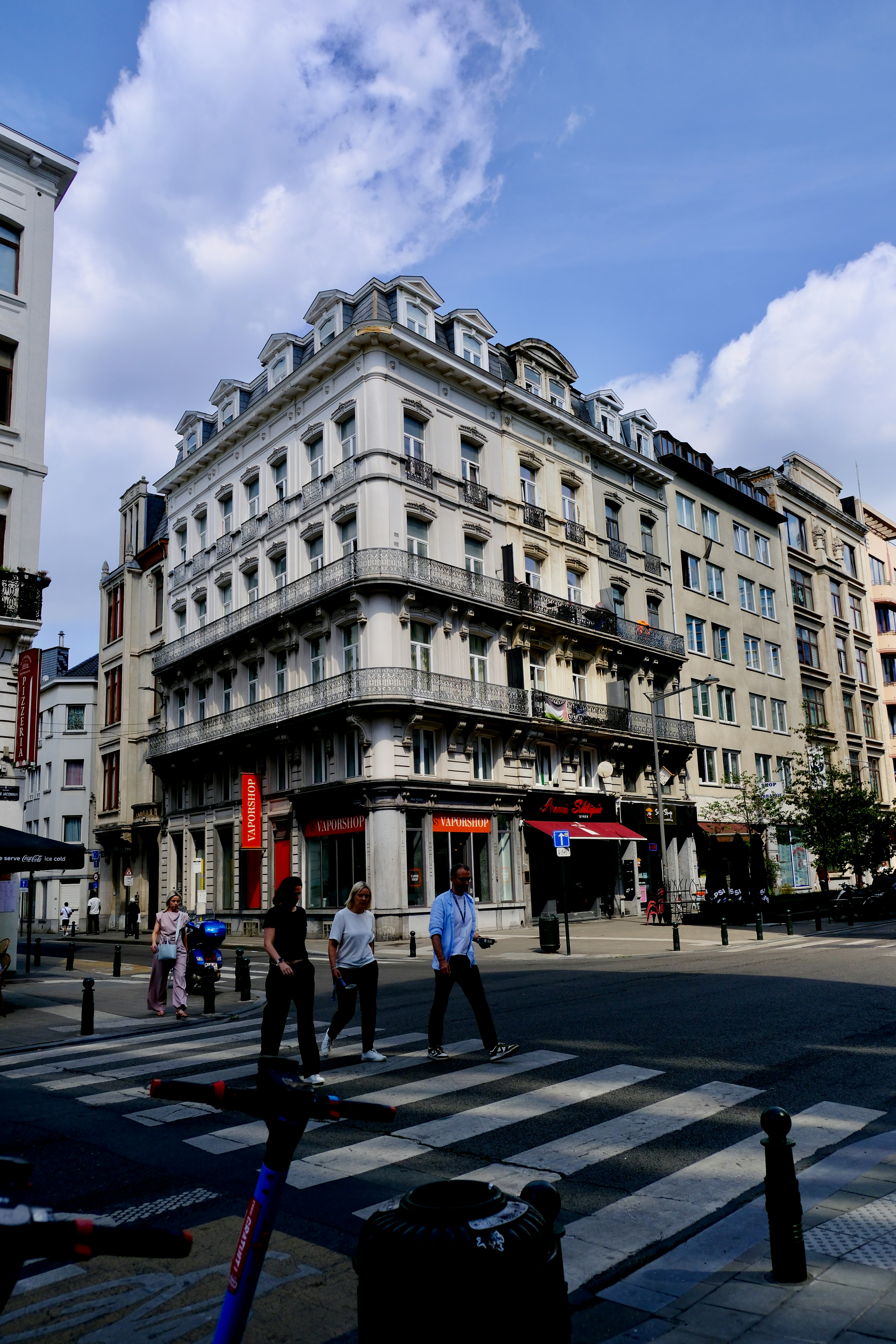 Cornered Cornerstone: A Parisian Street Corner with a Leaning Balcony