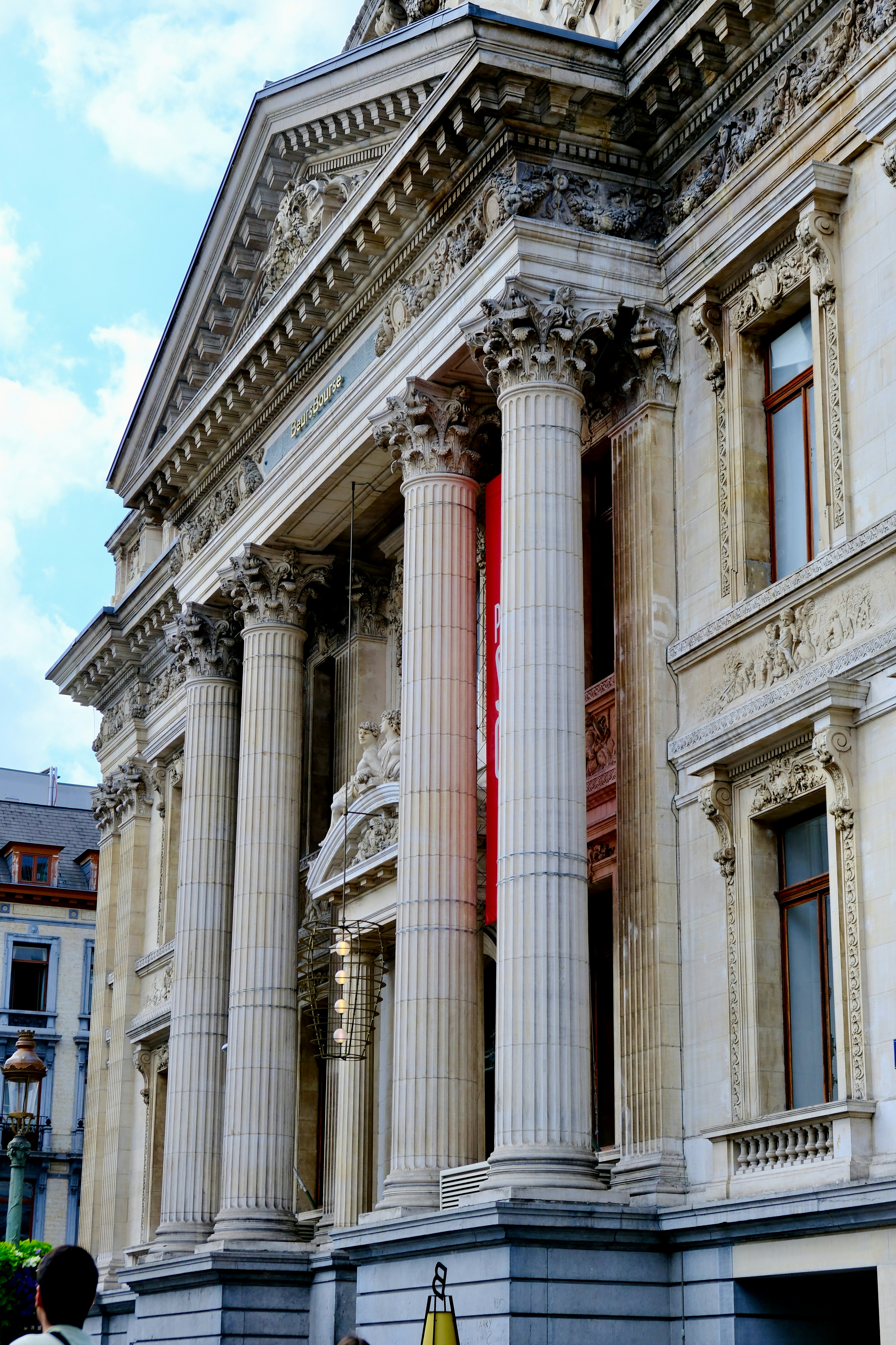 Grand Facade in Stone: Corinthian Columns Framing a Historic Entrance