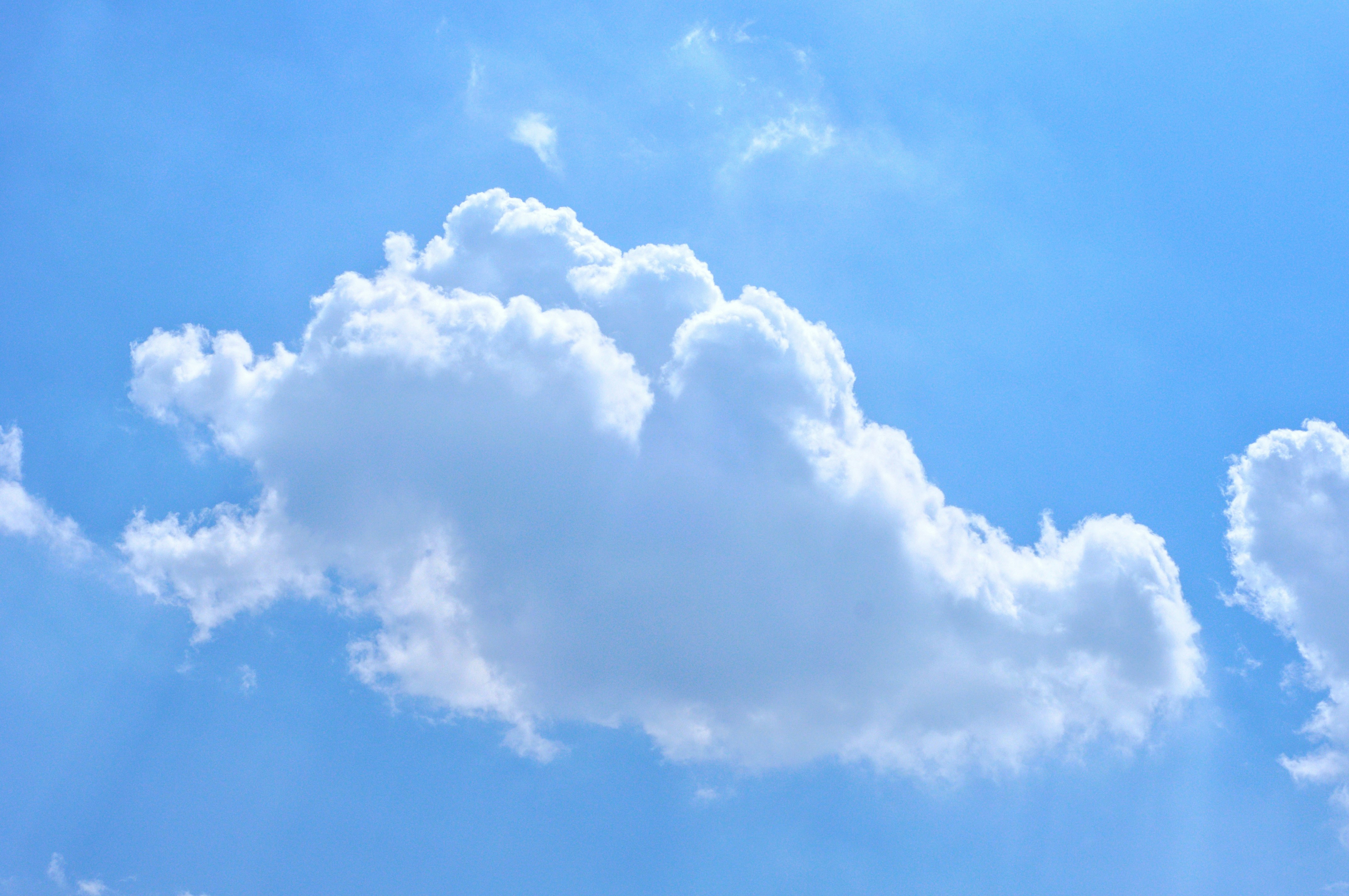 Cumulus Whisper over a Brisk Blue Sky