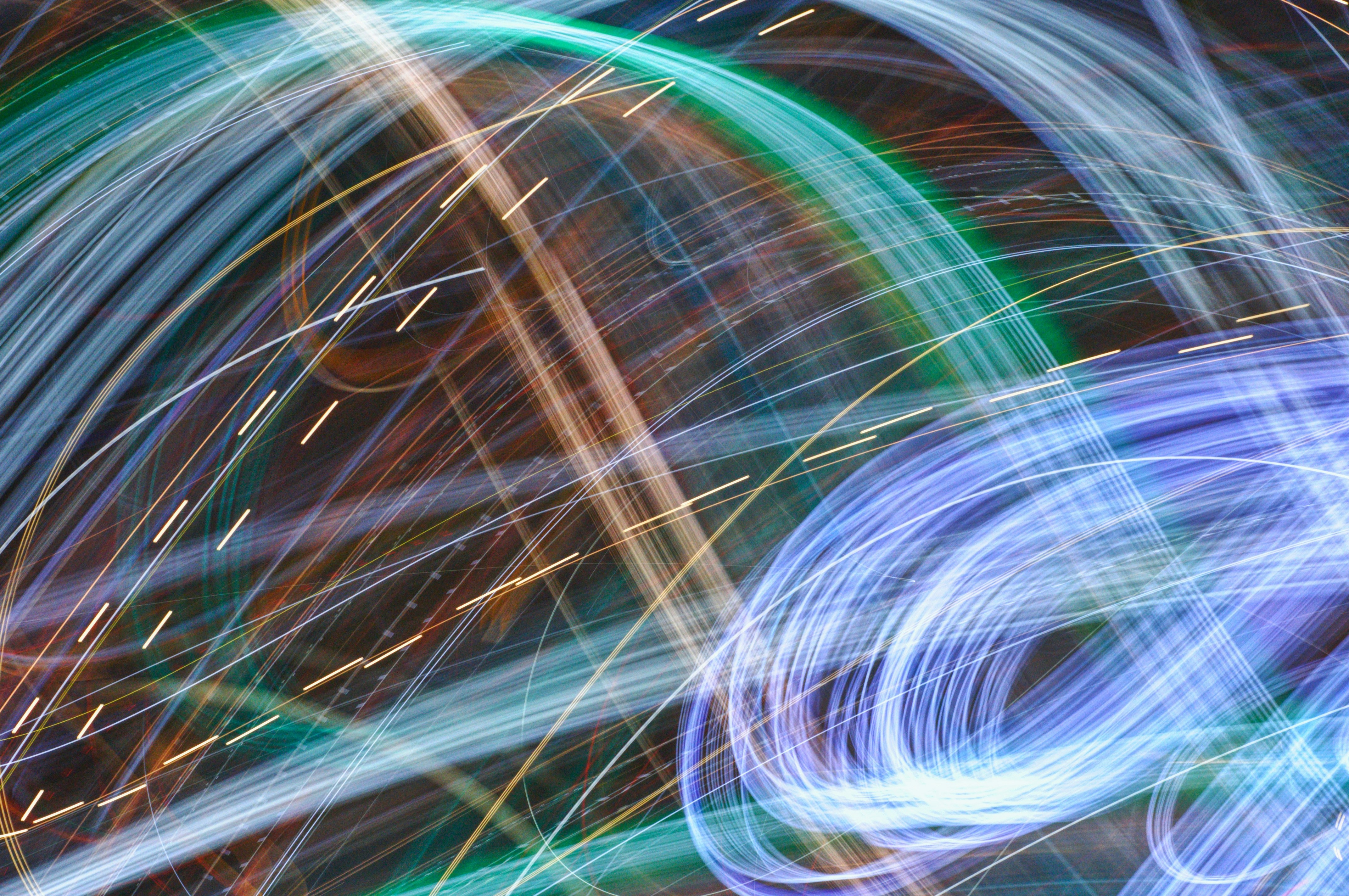 Luminary Trails: Chaotic Helix of Colored Light
