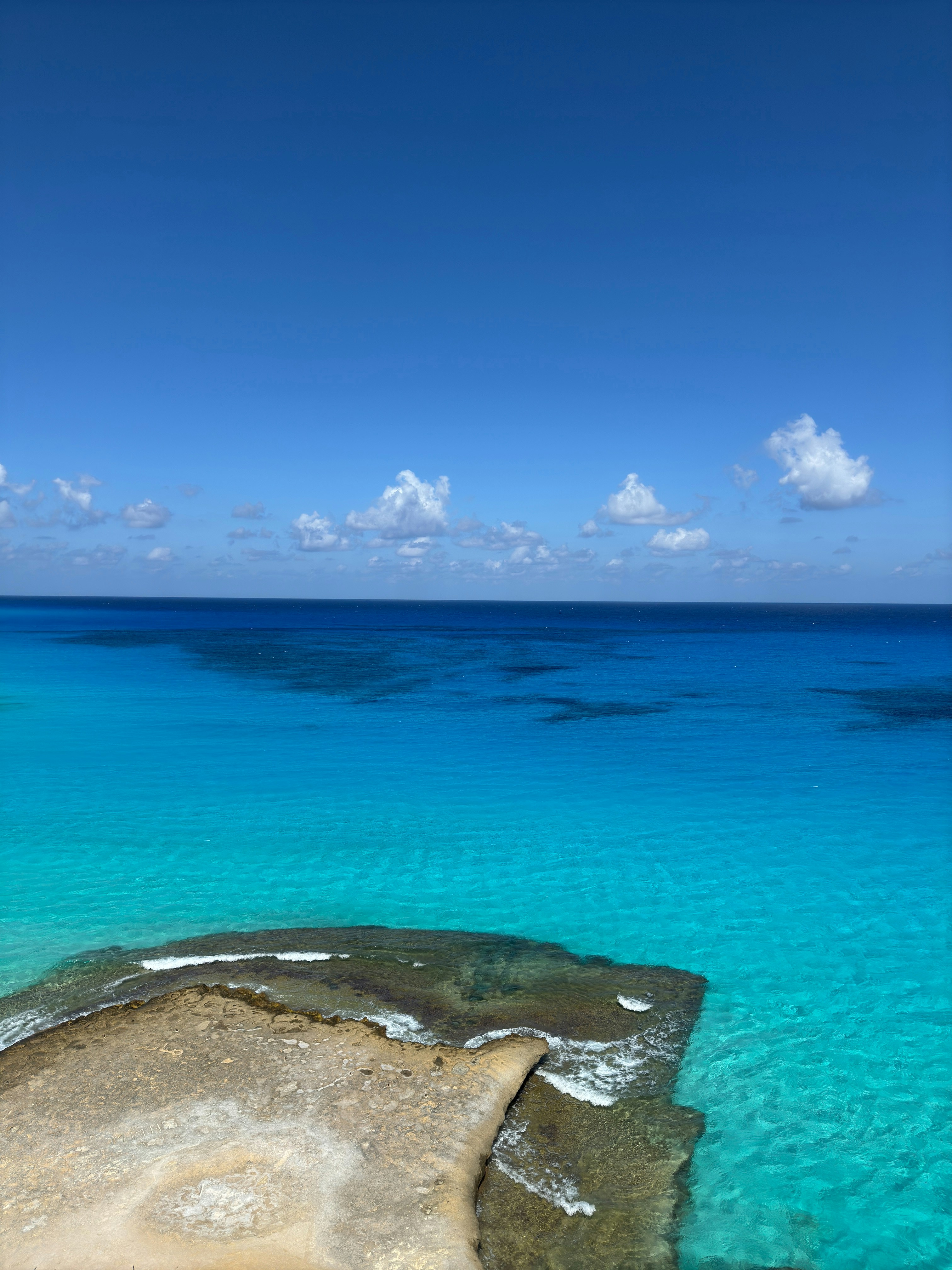 Azure Terrace: A Quiet Edge of Coral and Sky
