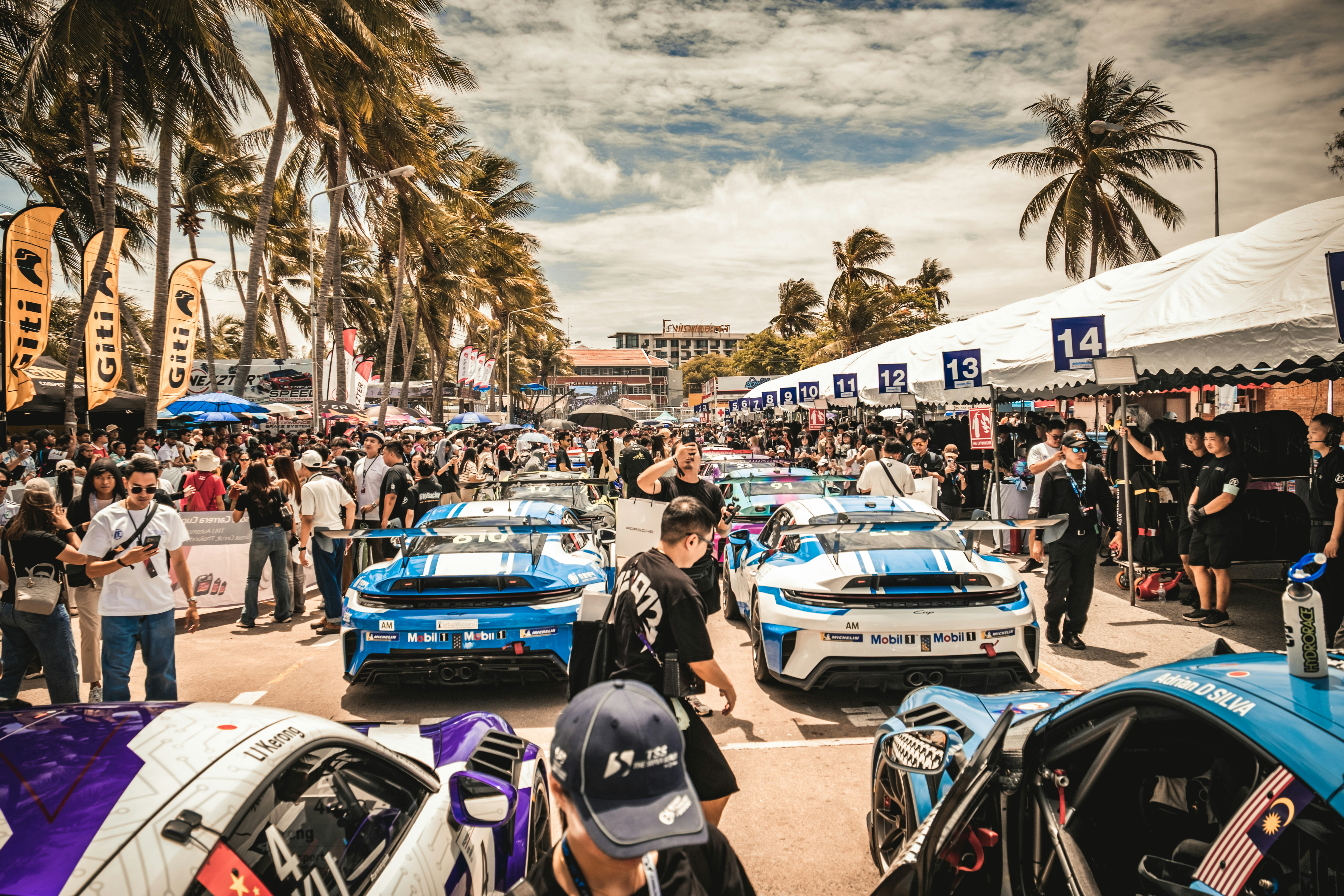 Race Day Pulse: A Tangerine Sky Over Packed Pit Lane