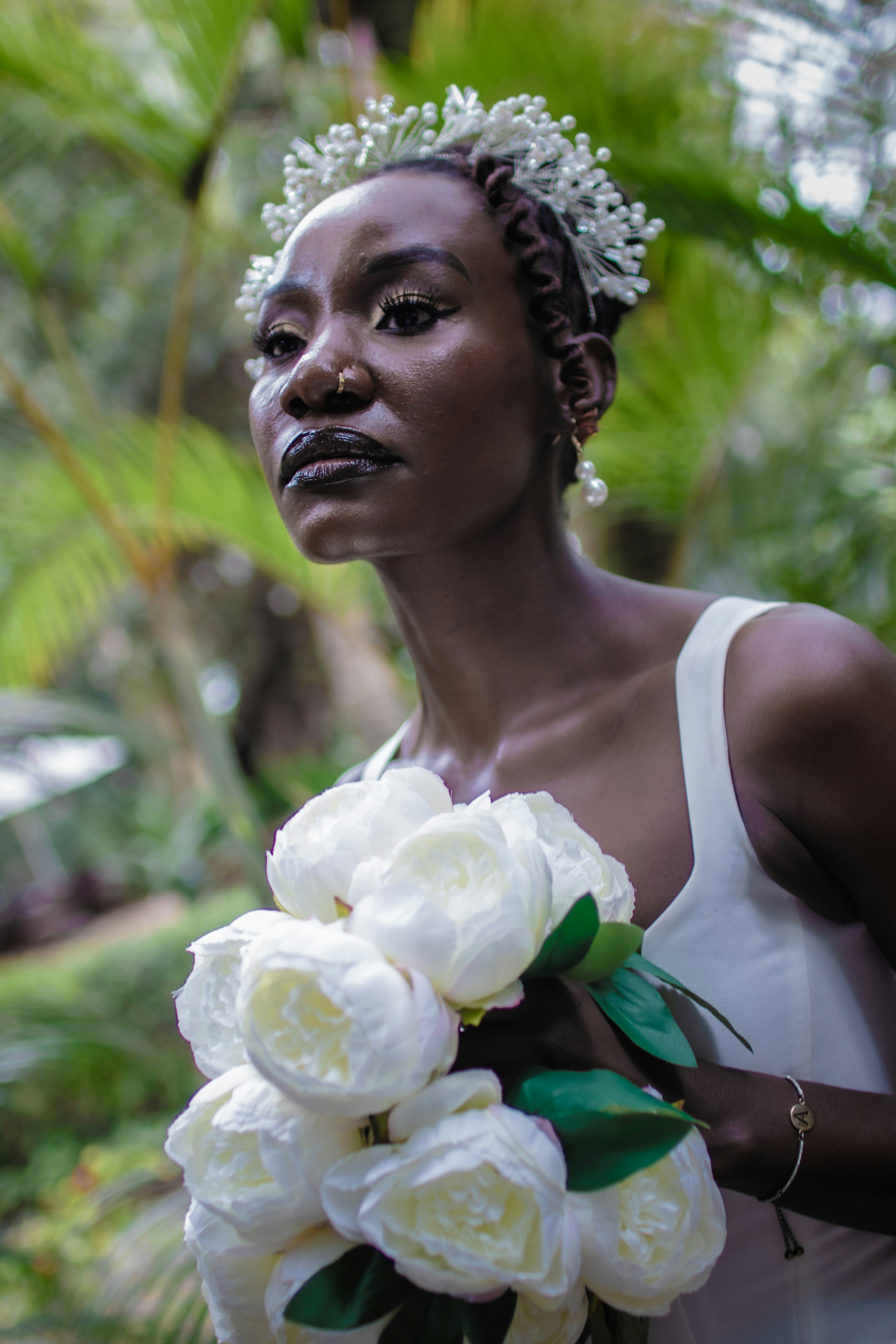 Bride in Bloom: A Portrait of Grace Amid Tropical Green
