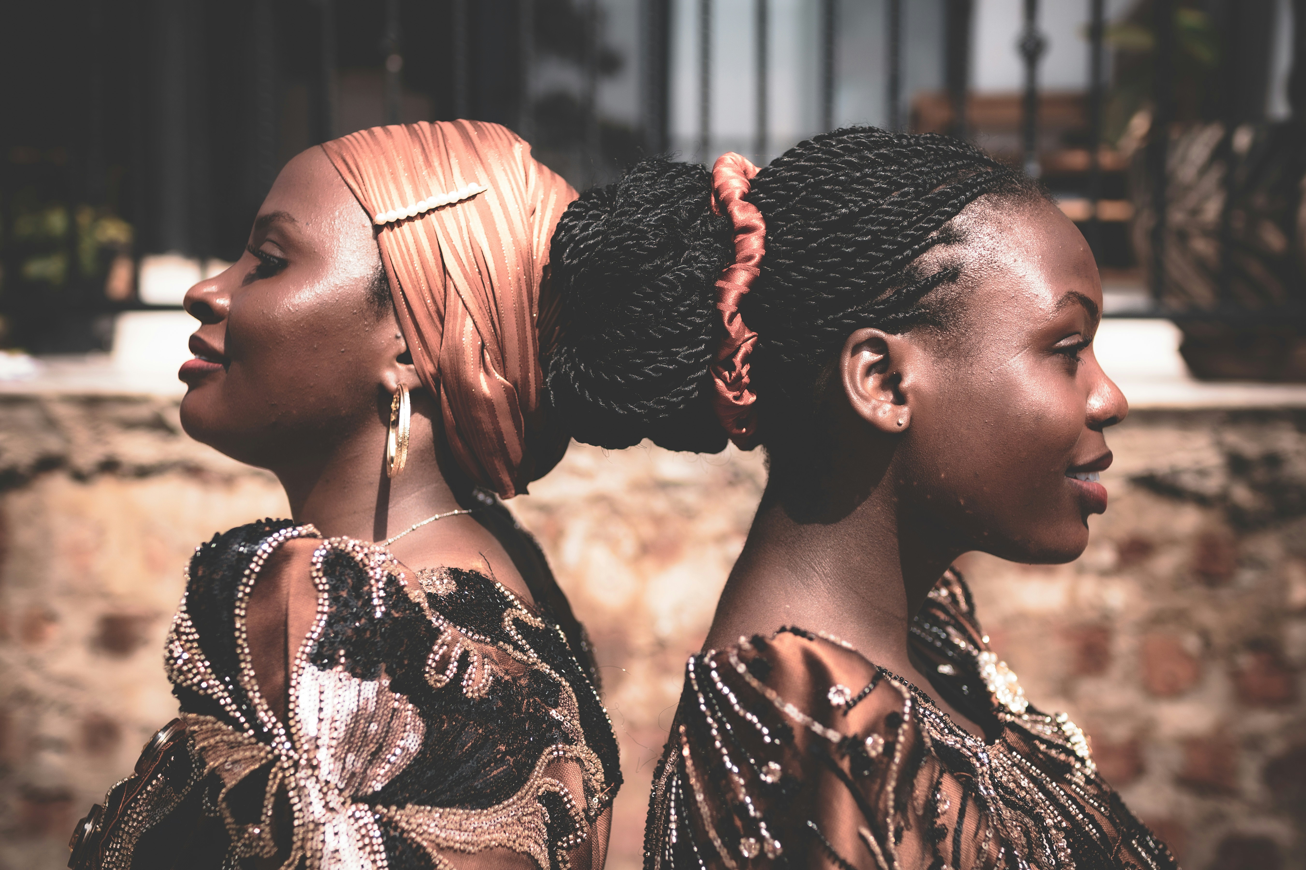 Dual Echoes: Back-to-Back Portraits in Velvet and Brick
