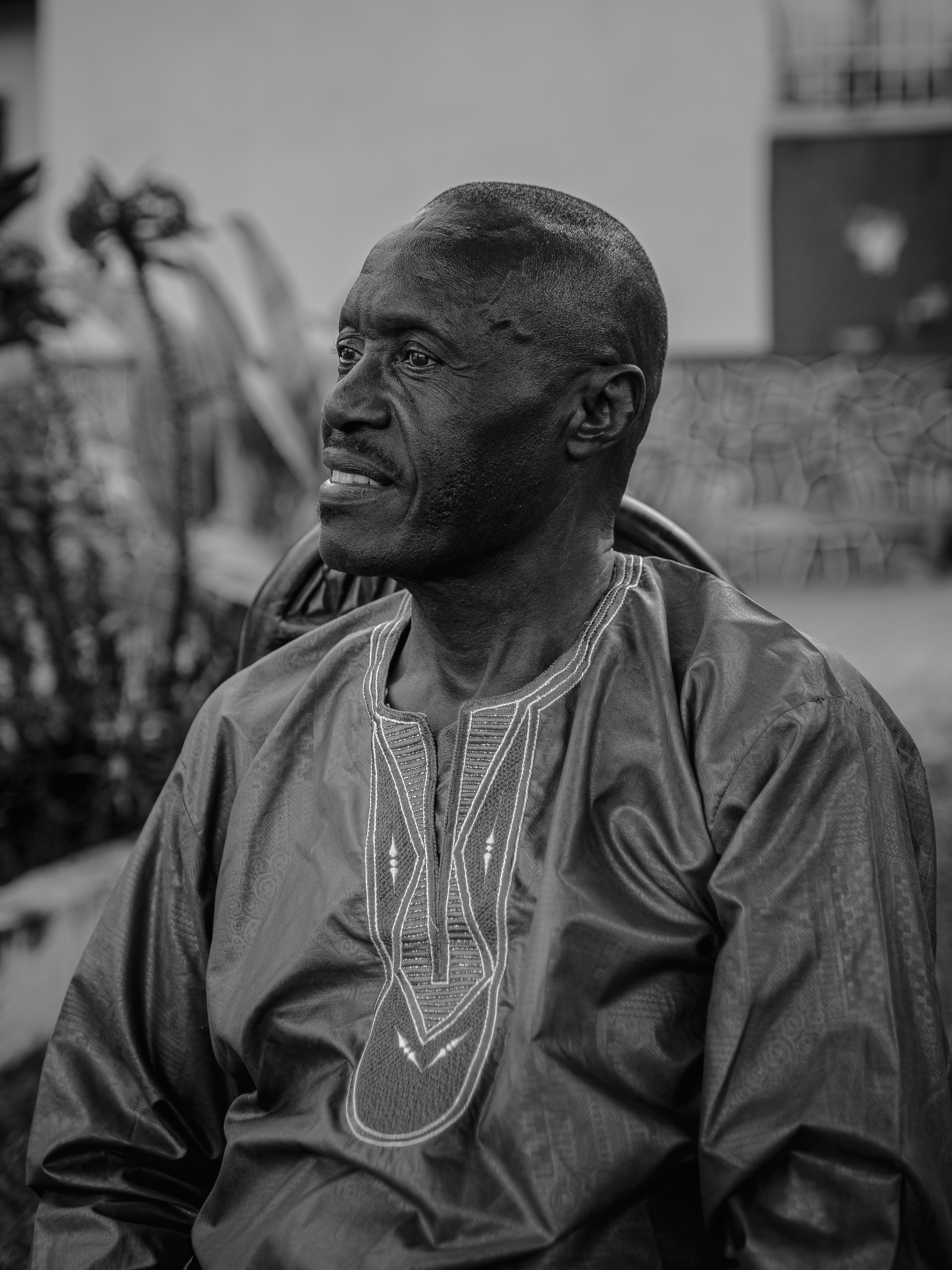 Portrait in Quiet Strength: A Moment on the Street in Mono