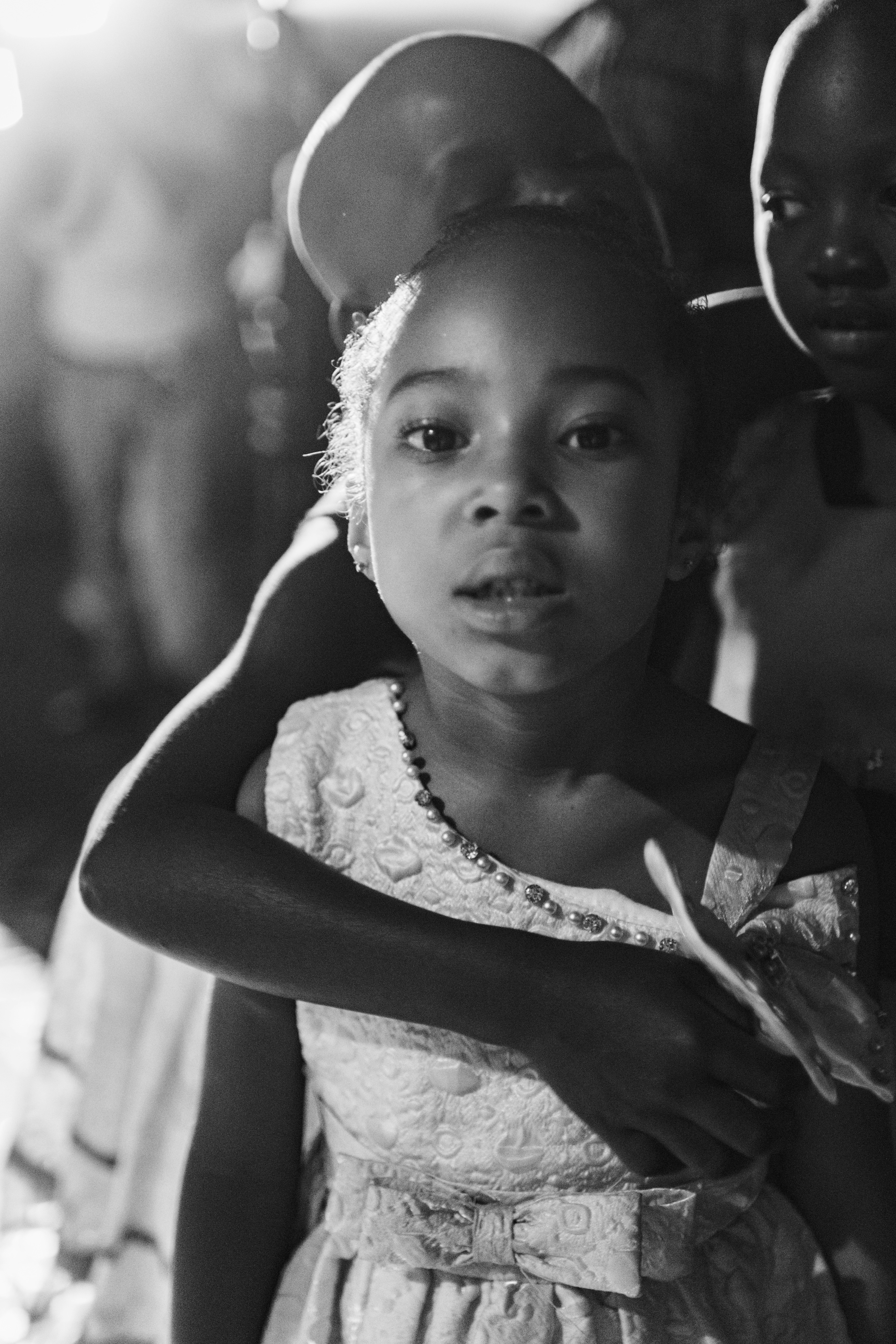 Centered Gaze: A Quiet Moment Amid the Crowd