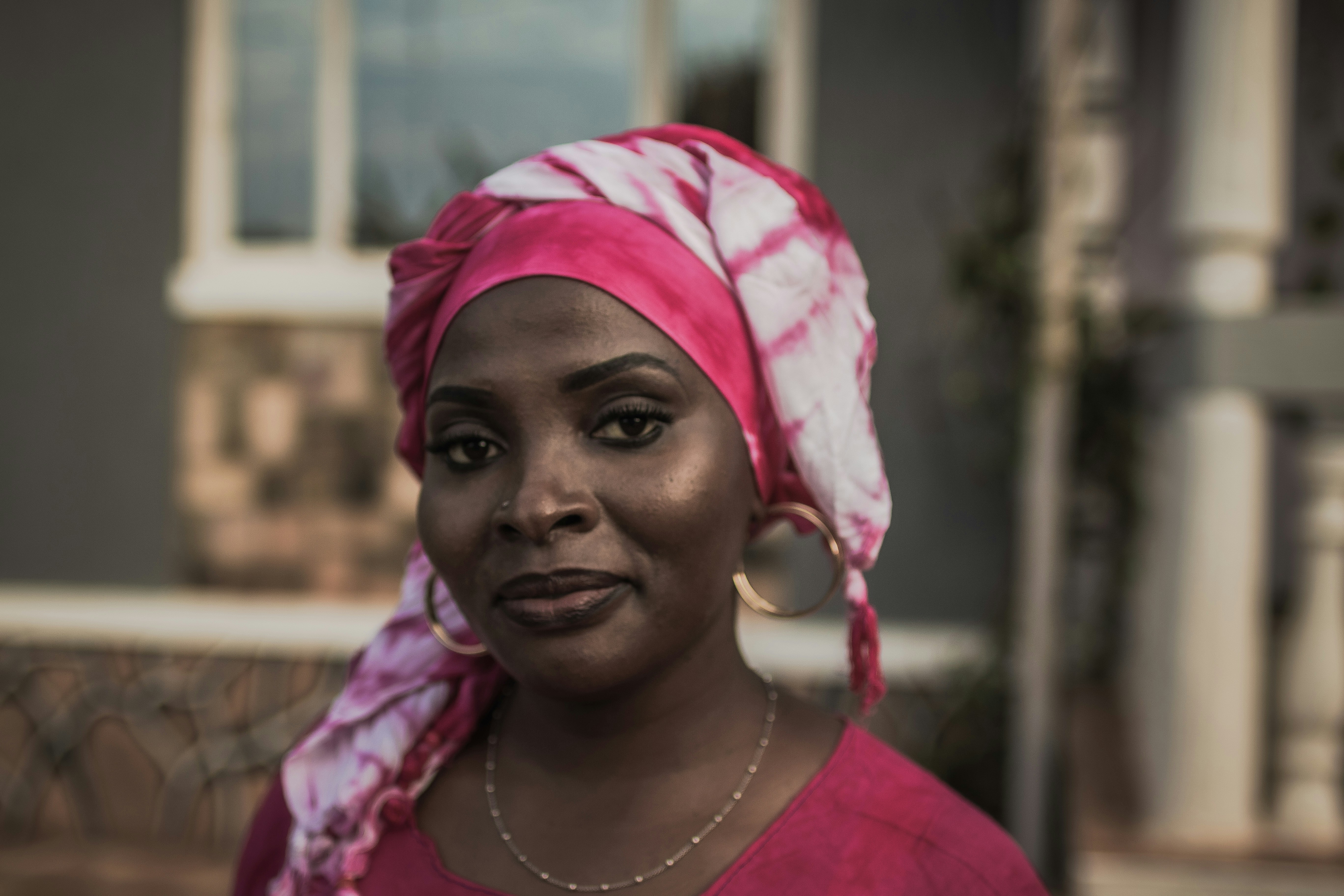 Vivid Confidence: A Portrait in Pink and Light