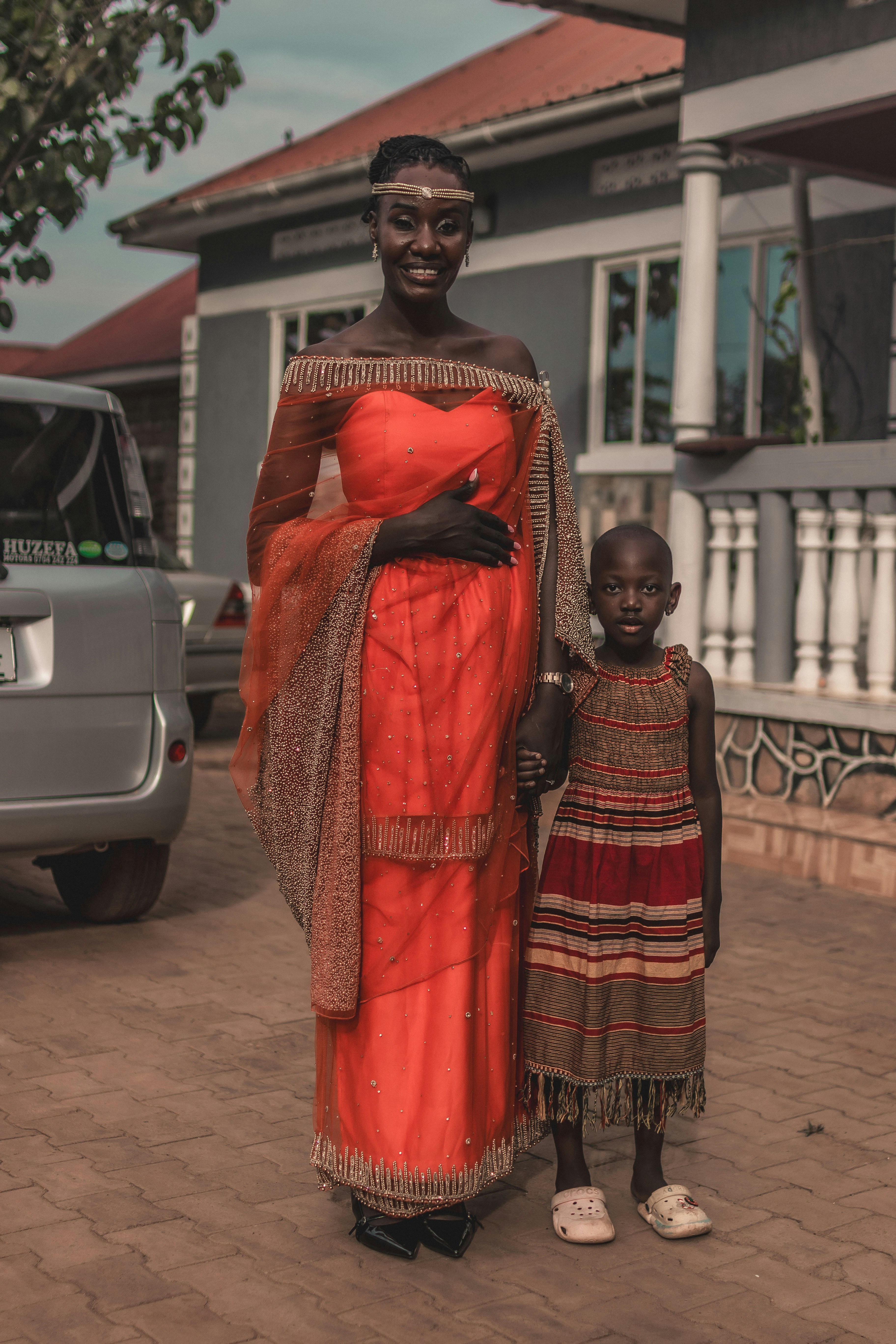 Bright Serenade: Mother and Child in Velvet Orange