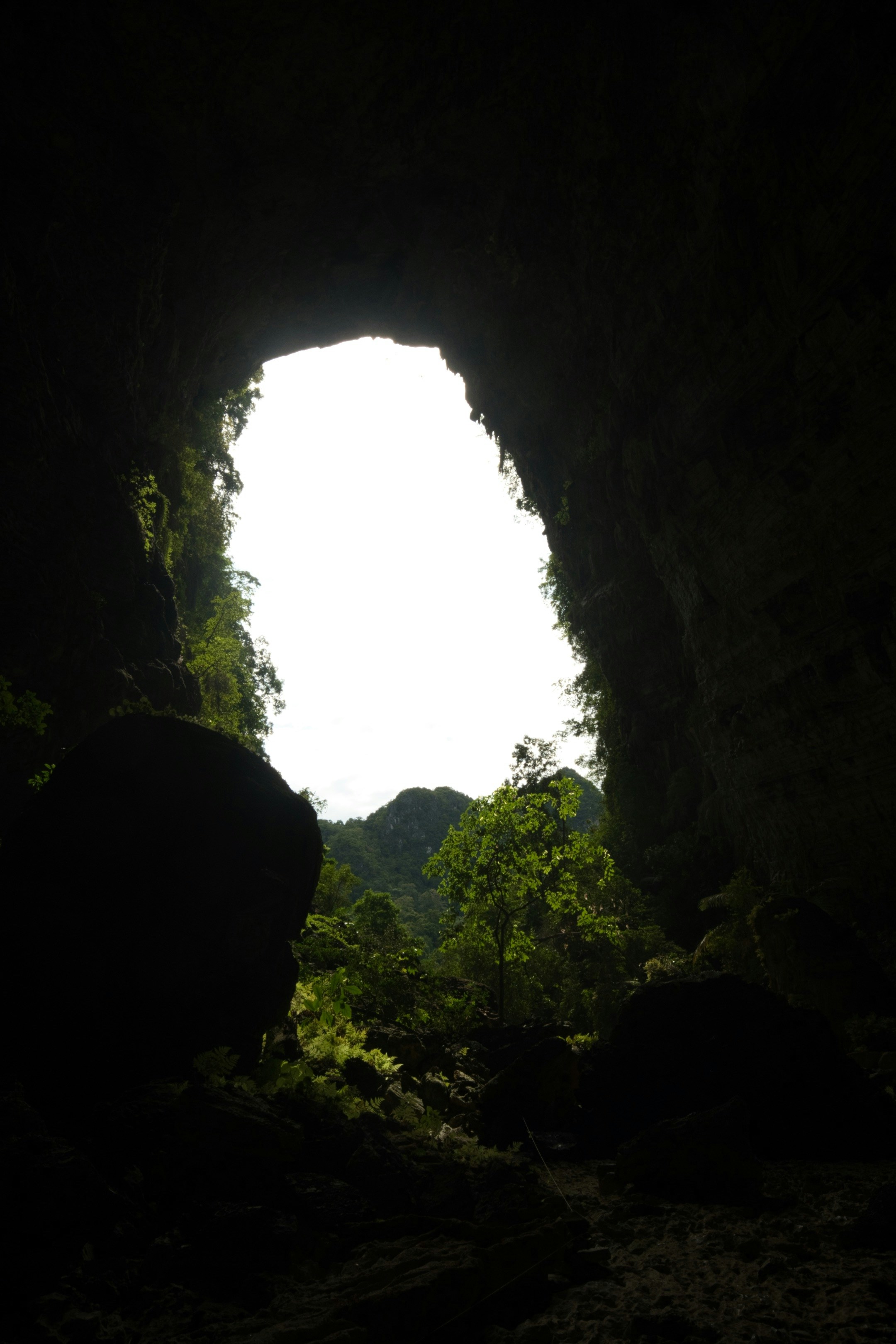 Emergence through a Dark Cavern to a Bright Sky