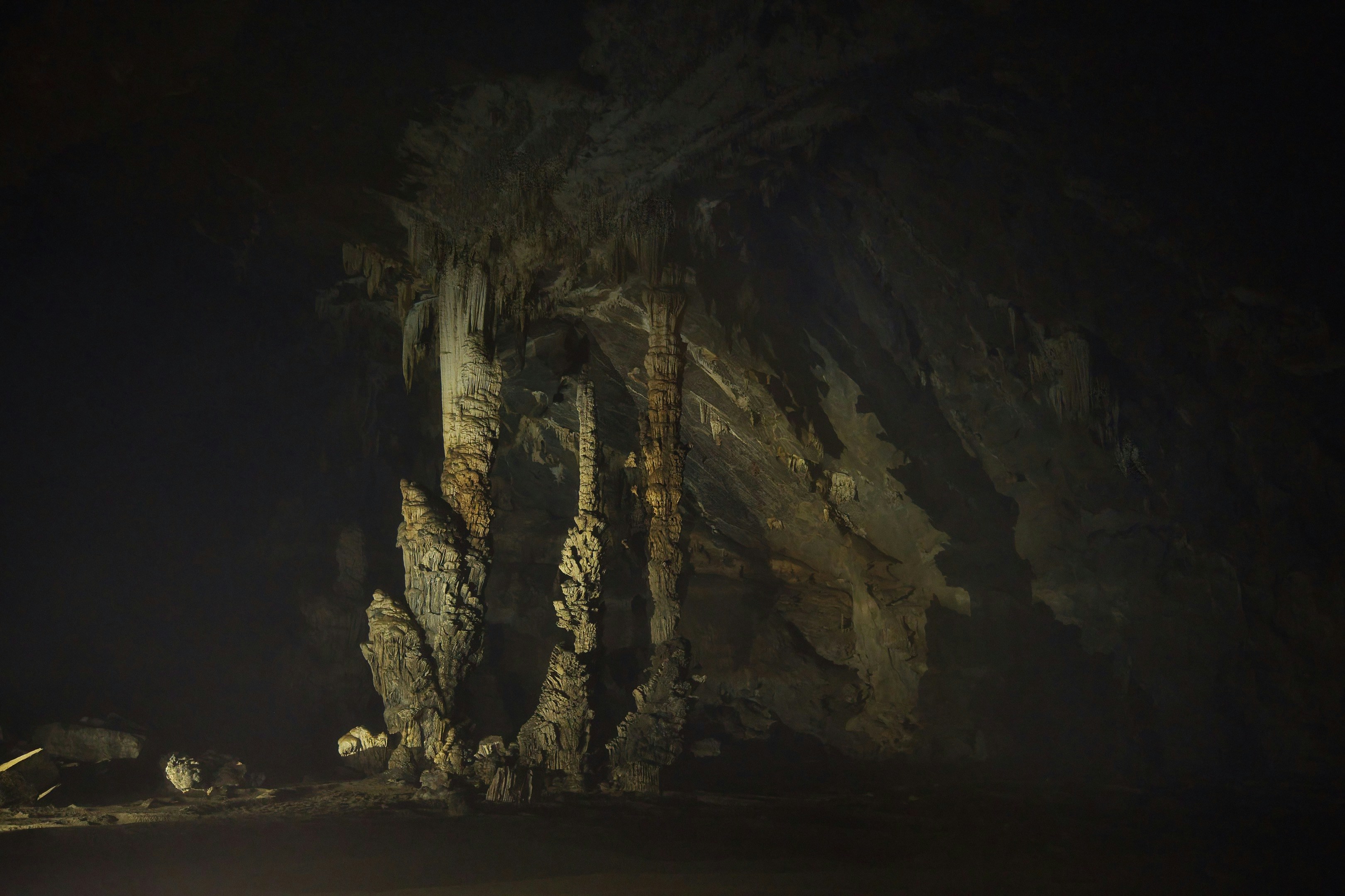 Cave Cathedral: Dim Light Illuminates Formed Columns