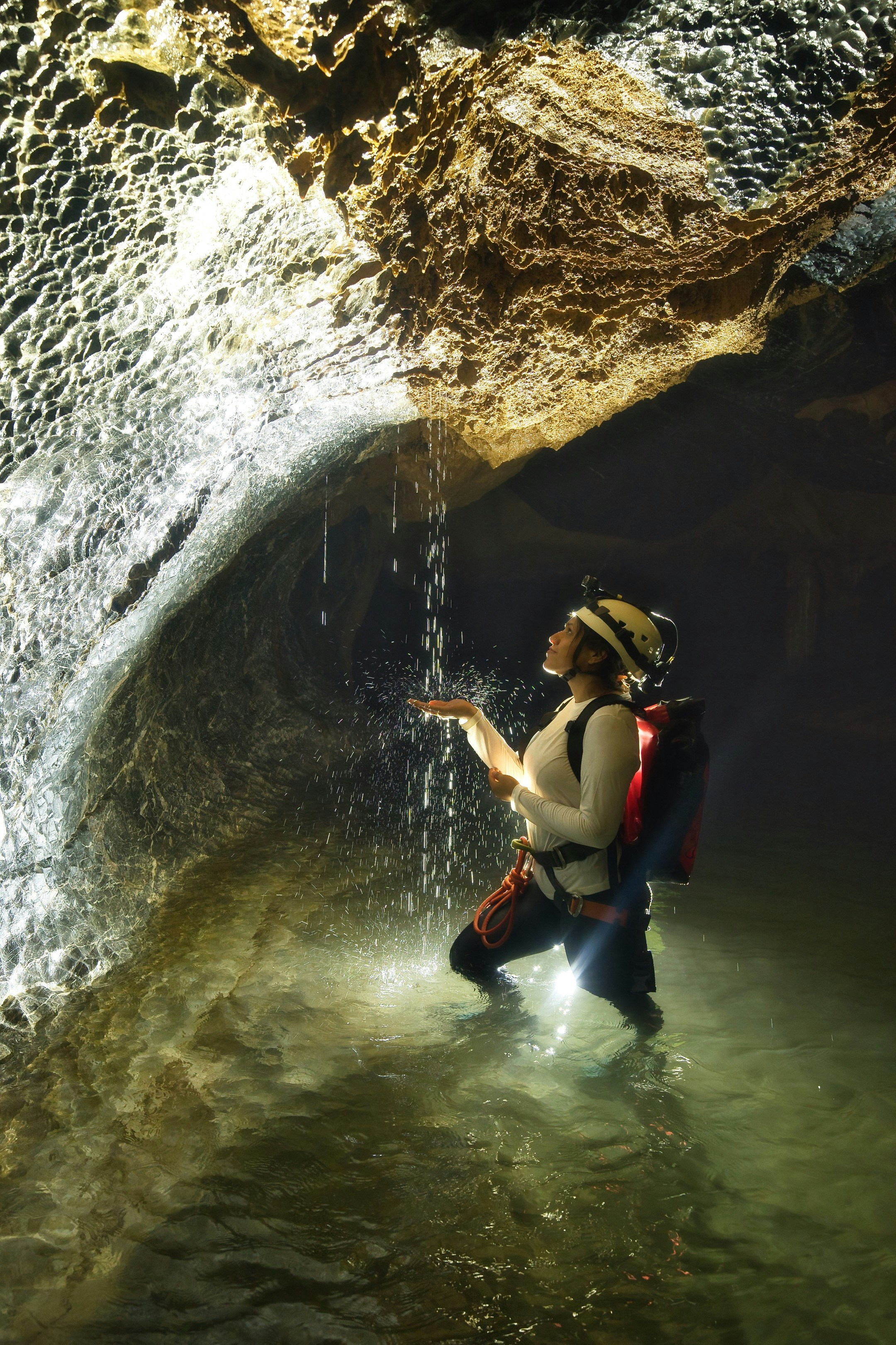 Traveler in a Cave Spring: Water, Light, and Resolve