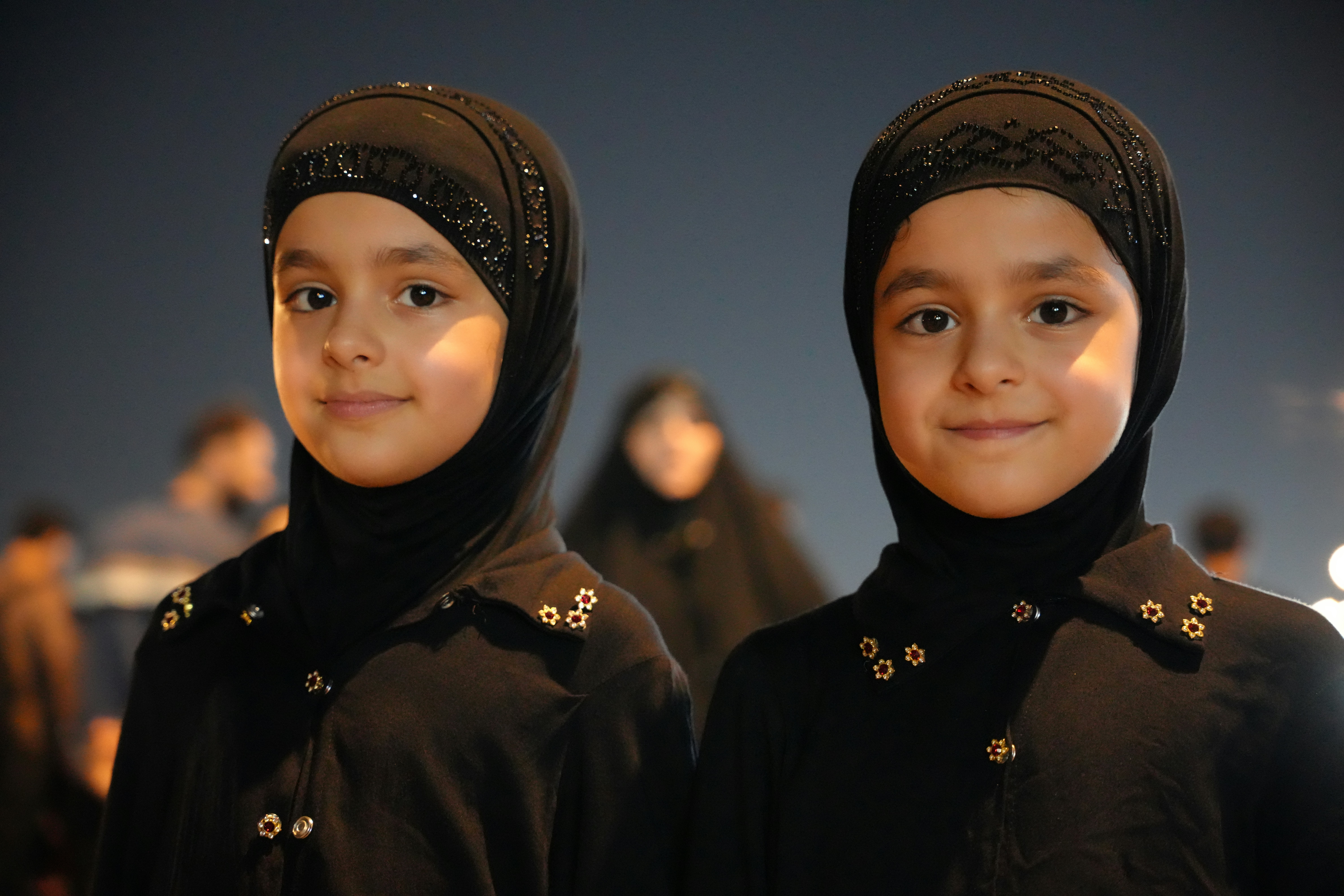 Twin Hijab Portraits Under Ambient Evening Light