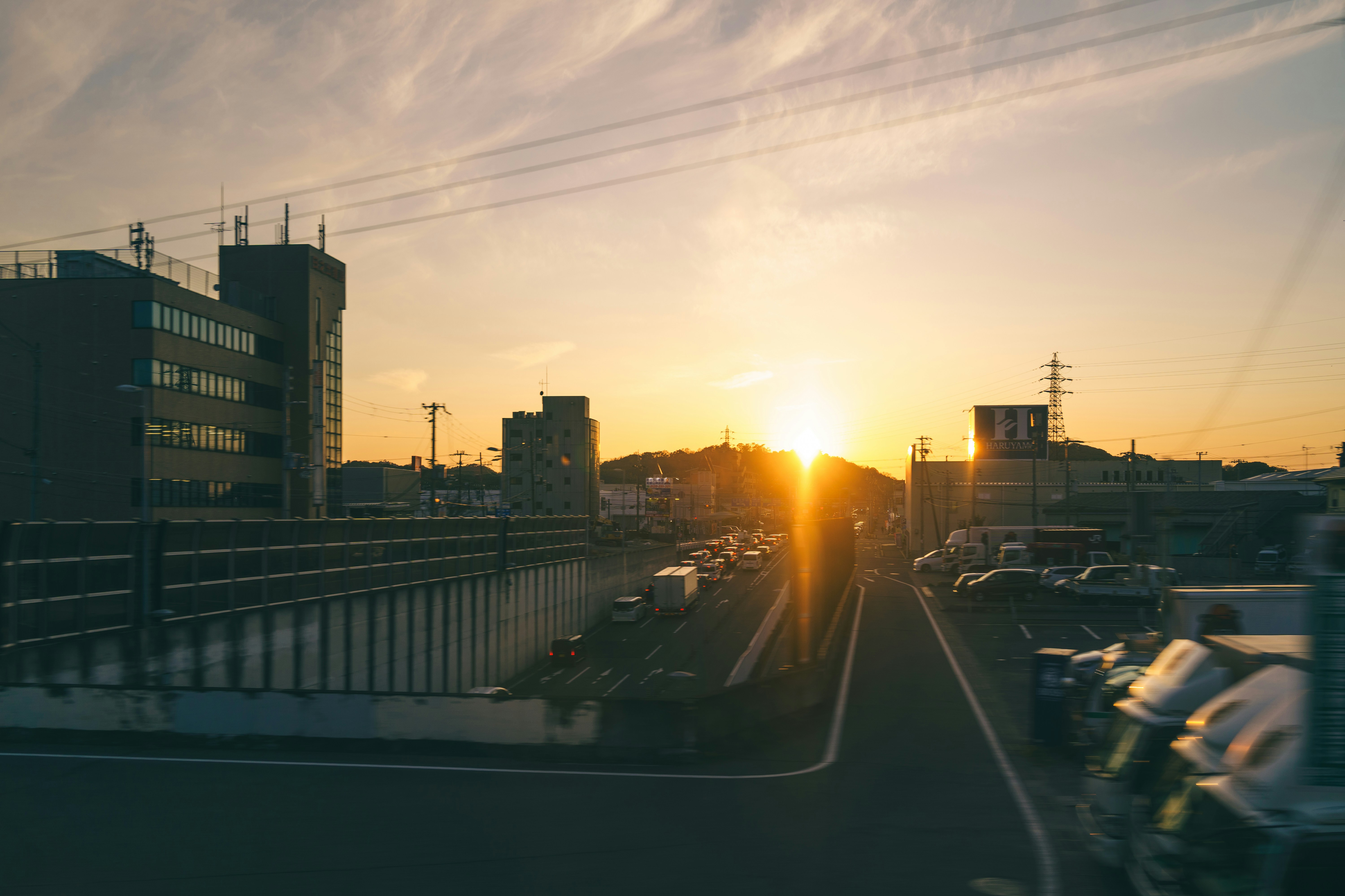 Sunlit City Edge: Morning Commute at the Horizon