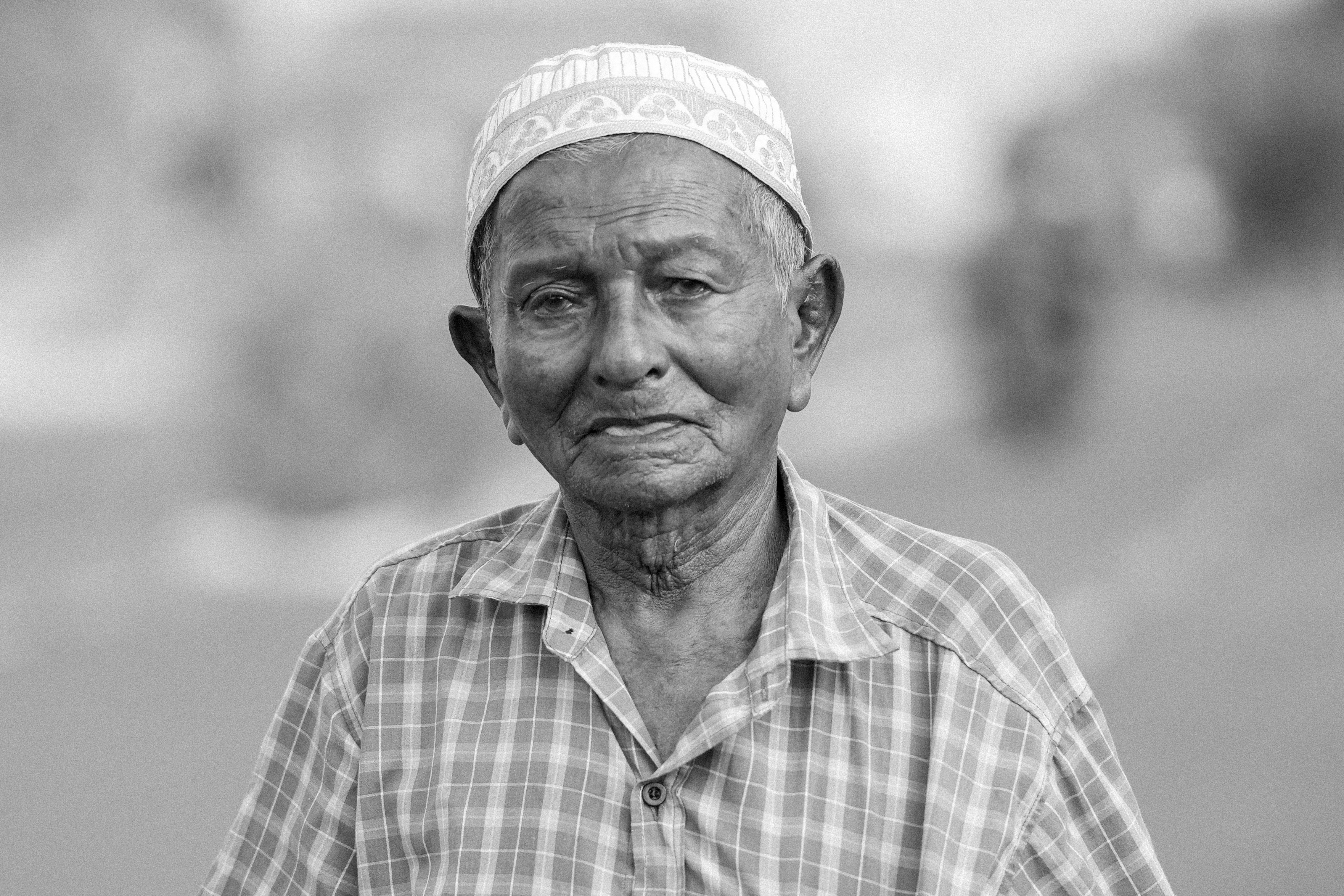 Quiet Daze: An Elder's Gaze in Weathered Light