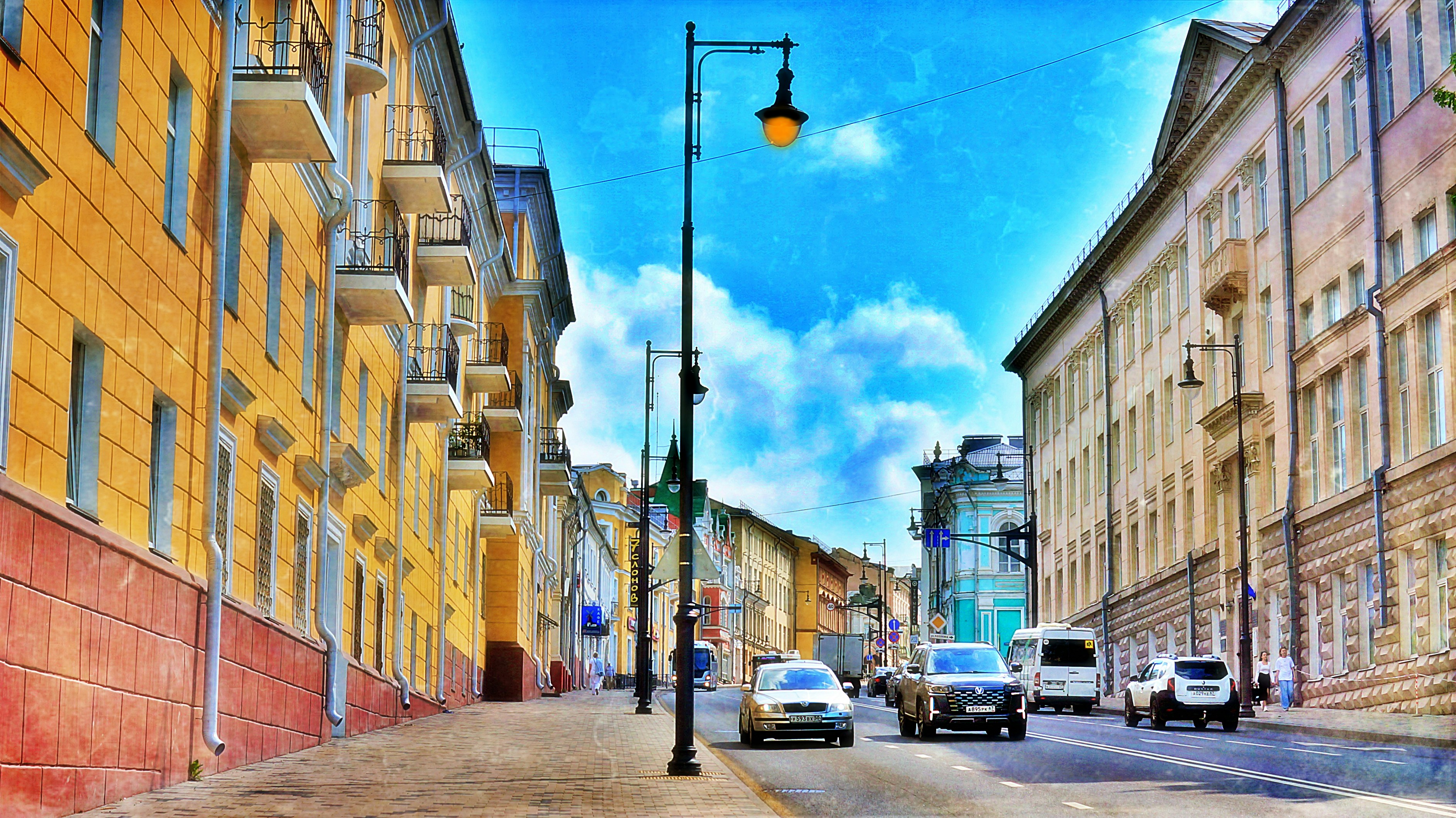Colorful City Street Converging Toward a Bright Sky