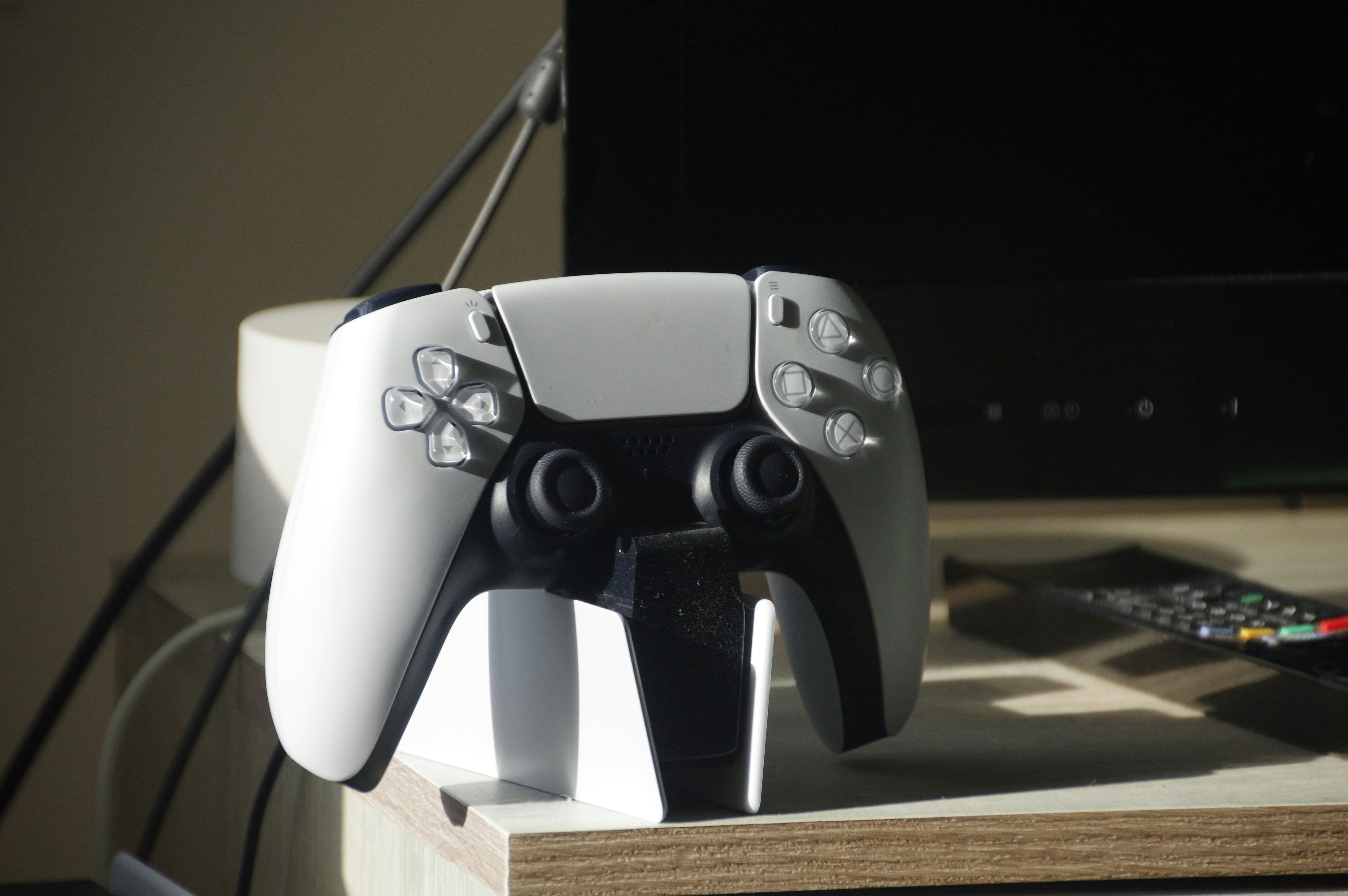 Cerulean Controller Resting on a Wooden Surface