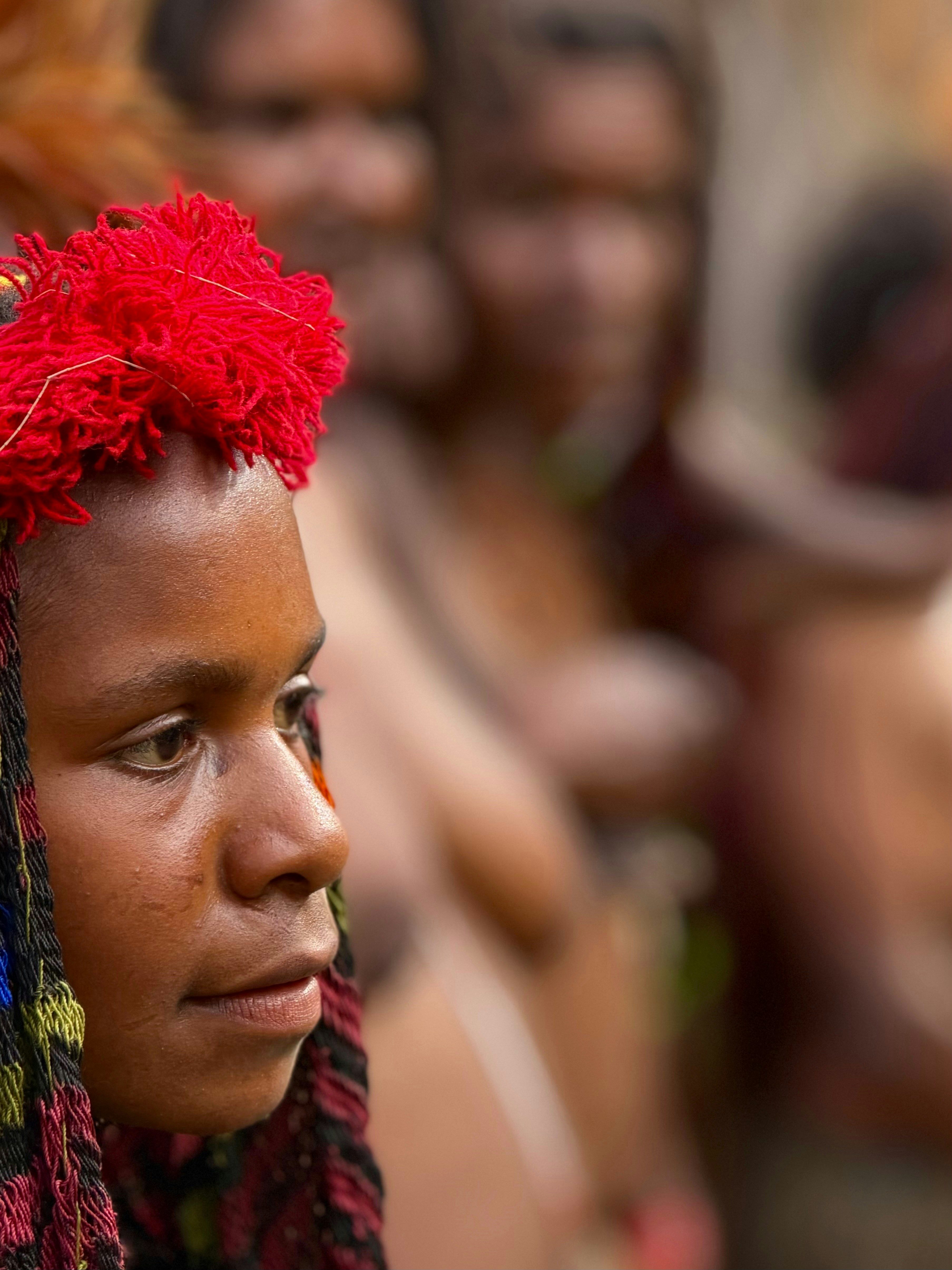 Red-adorned gaze: a portrait in soft focus and cultural context