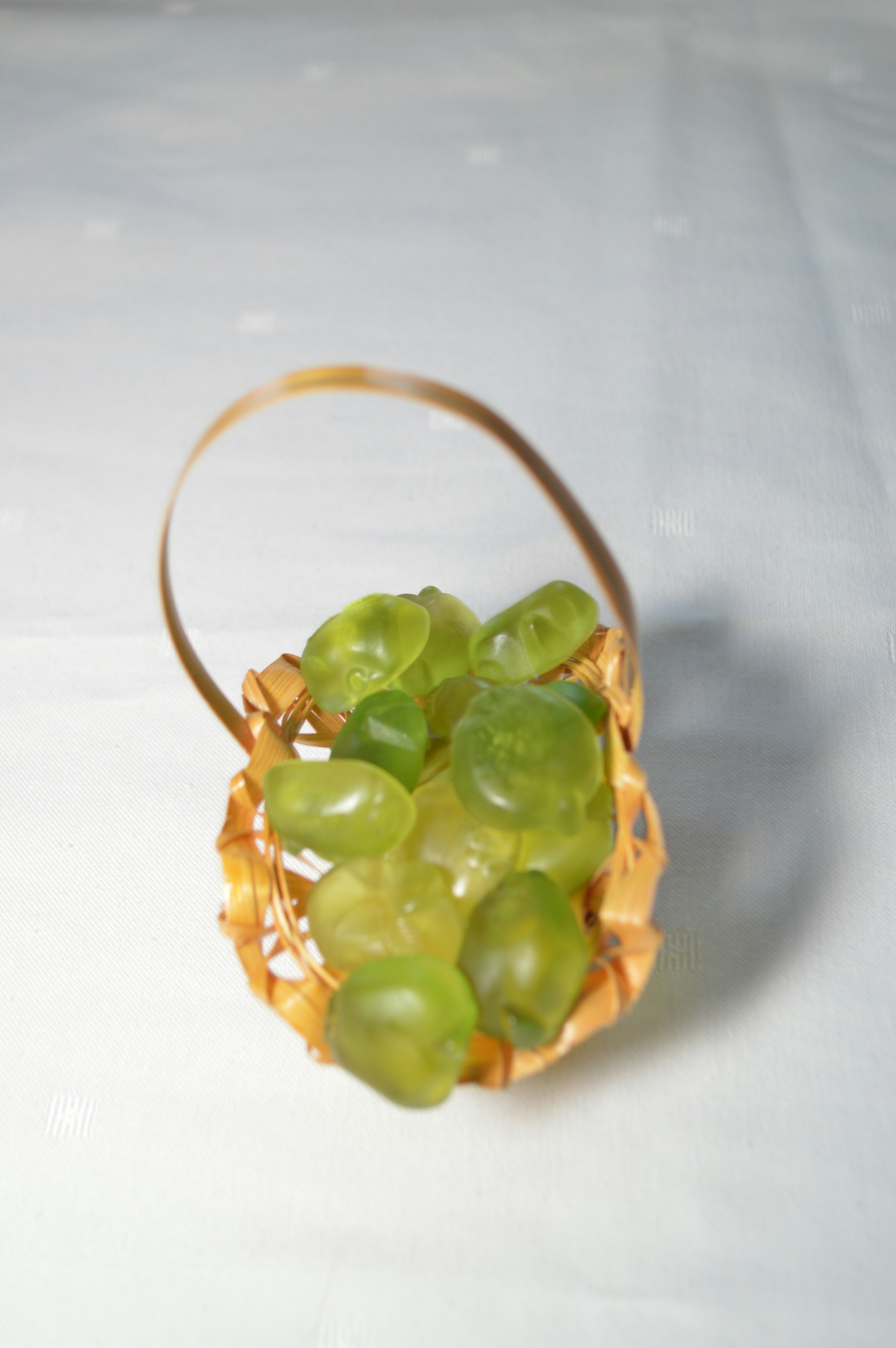 Green Gem Basket: A Tiny Harvest on White
